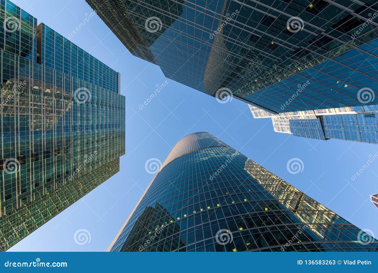 Skyscrapers bottom up view stock image. Image of building - 136583263