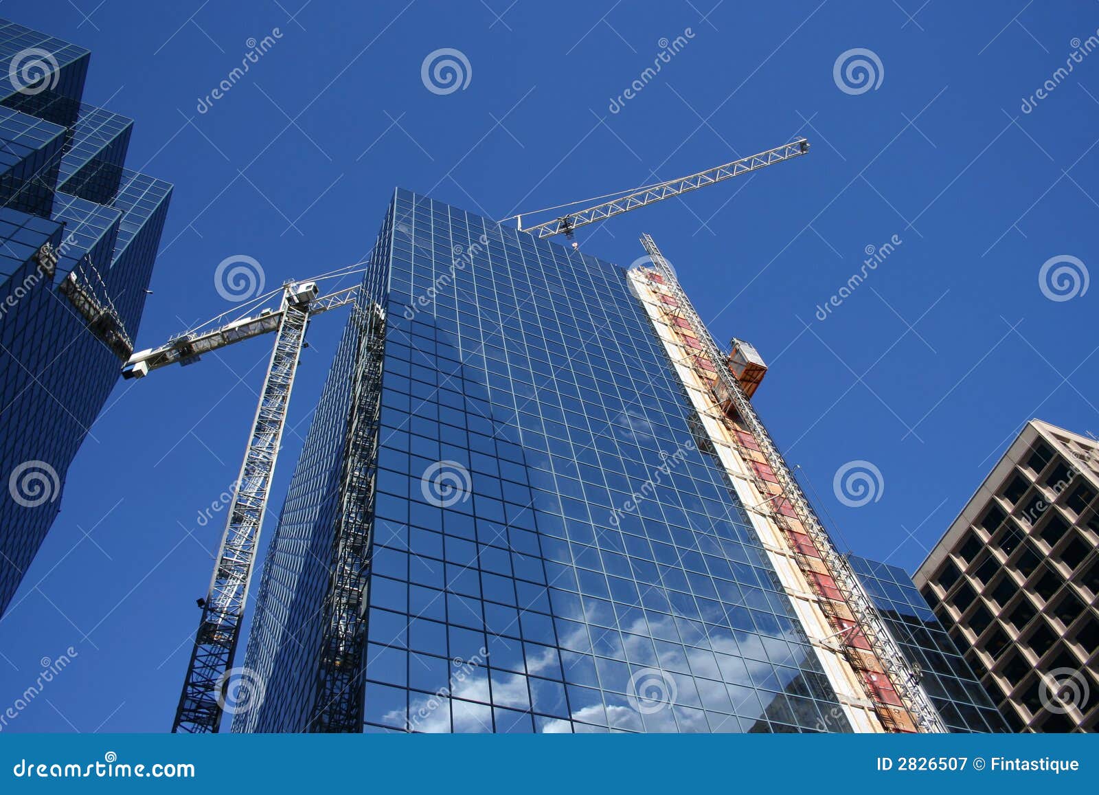 Skyscrapers and crane stock image. Image of tall, architecture - 2826507