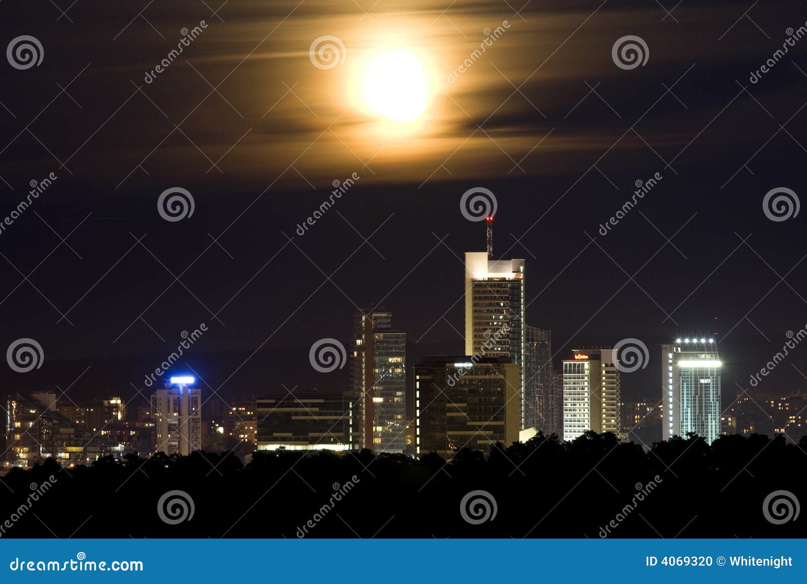 Skyscrapers and moon stock photo. Image of lights, moon - 4069320