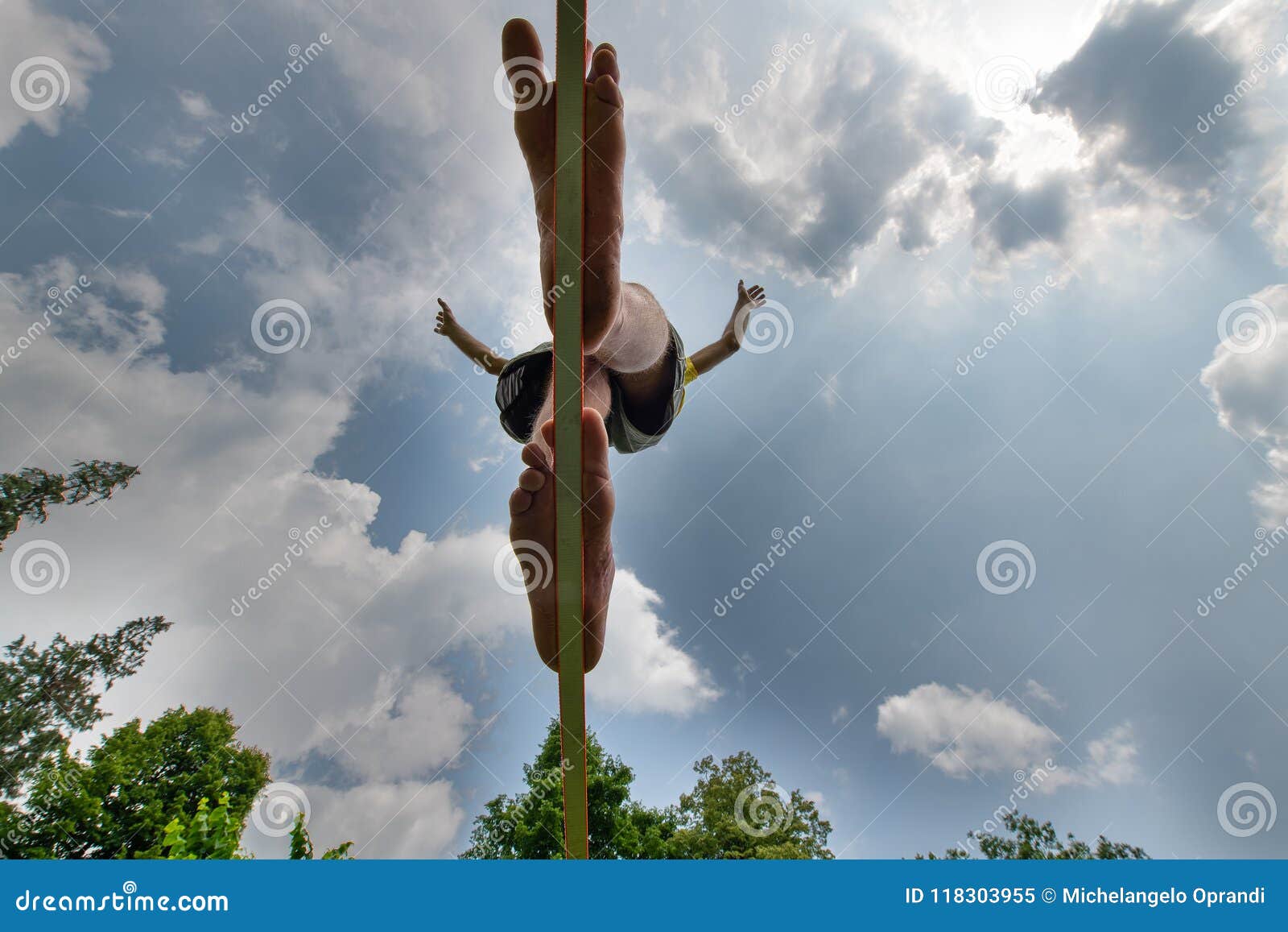 Slackline. a Barefoot Boy Walking on a Webbing in Balance Stock Image ...