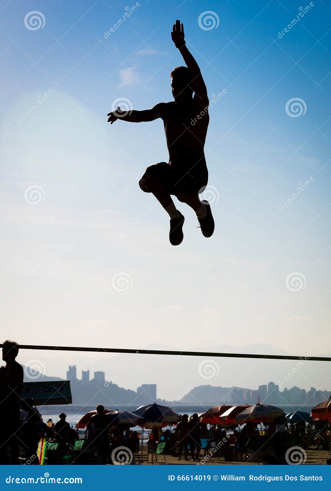 Slackline in the beach stock image. Image of beach, parasol - 66614019