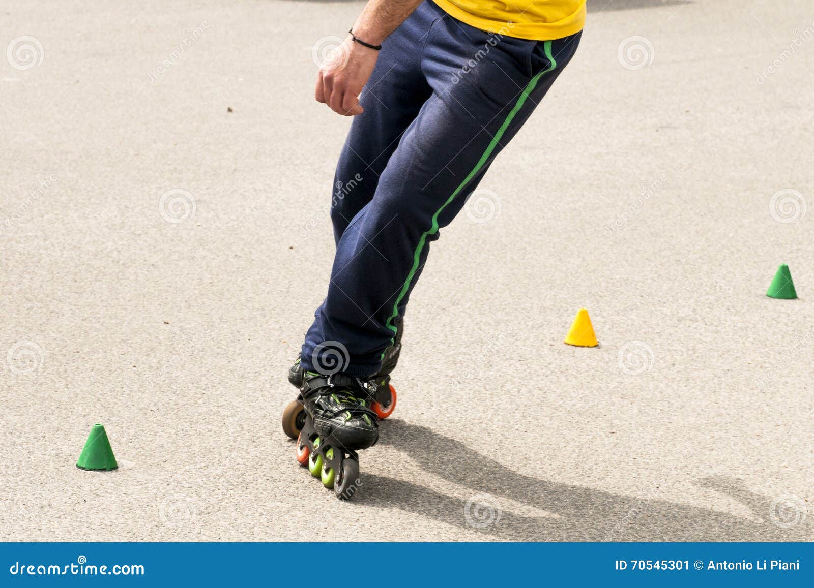 Slalom with Inline skates stock image. Image of people - 70545301