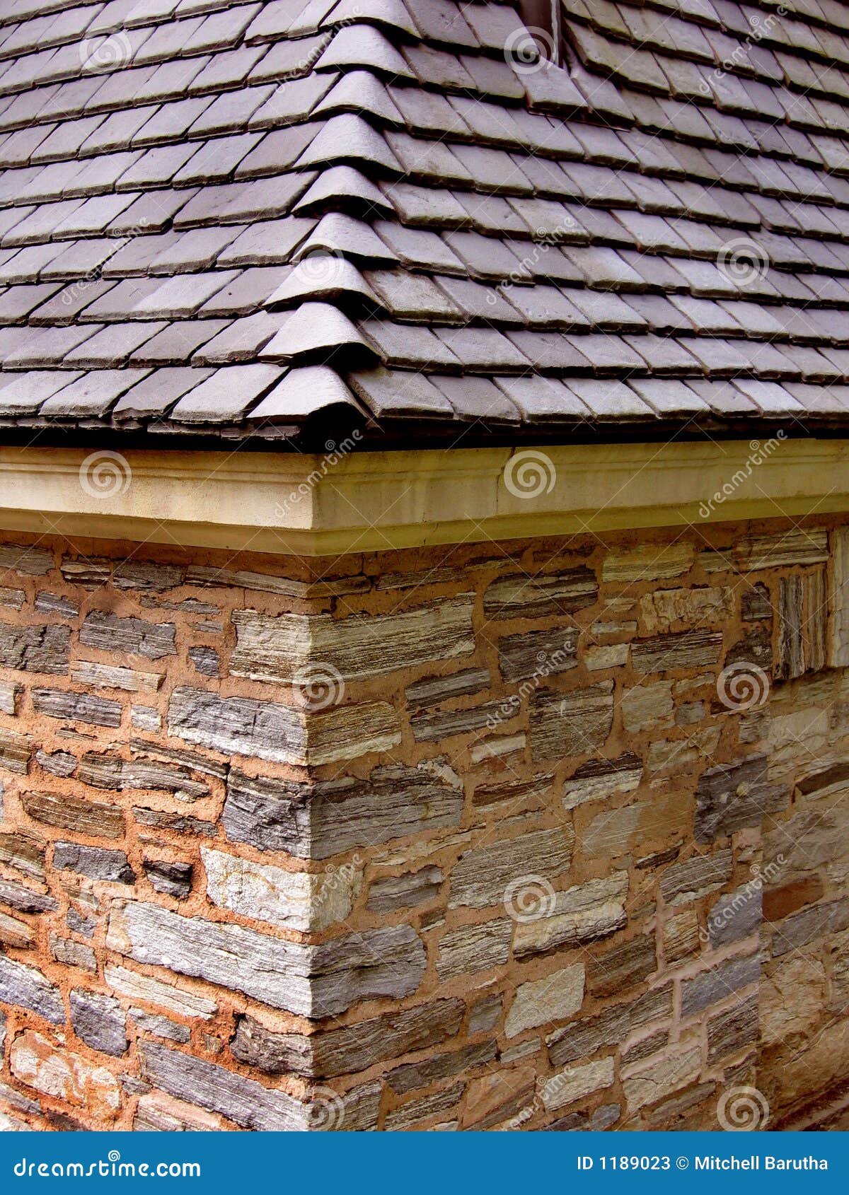 Slate roof with stone wall stock image. Image of exterior - 1189023
