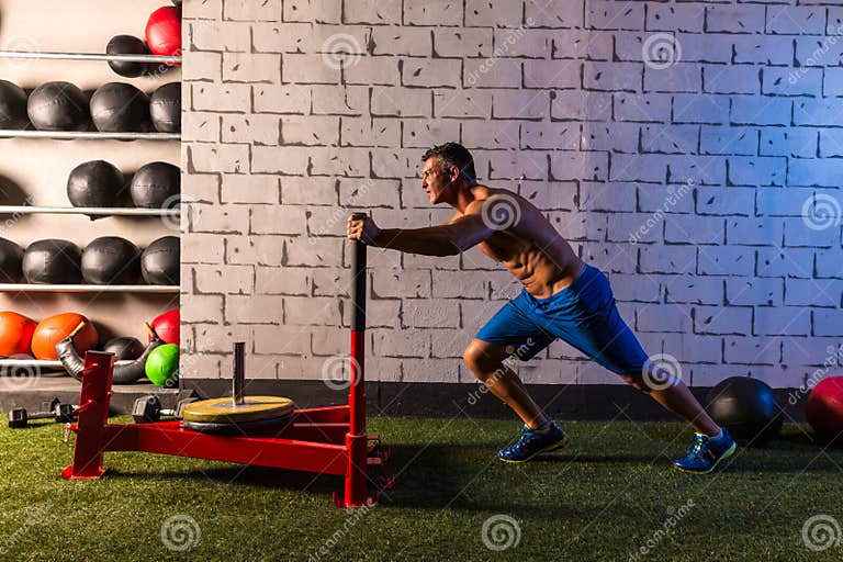 Sled Push Man Pushing Weights Workout Stock Image - Image of masculine ...