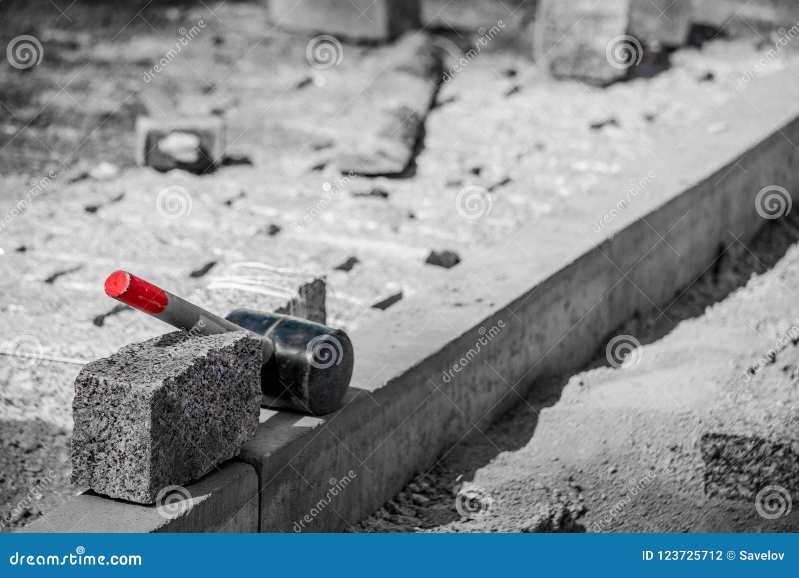 The Sledgehammer on the Curb Lies with the Construction of Paving Stone ...