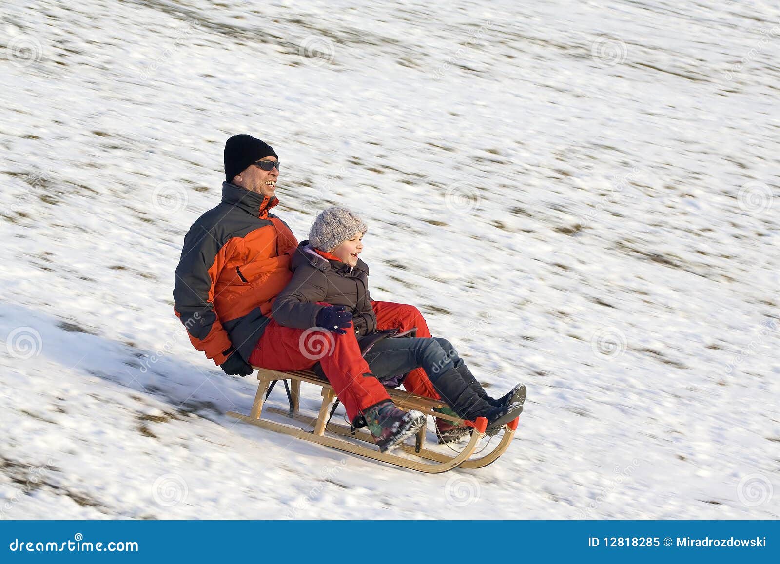 Sledging - winter fun stock image. Image of jacket, child - 12818285