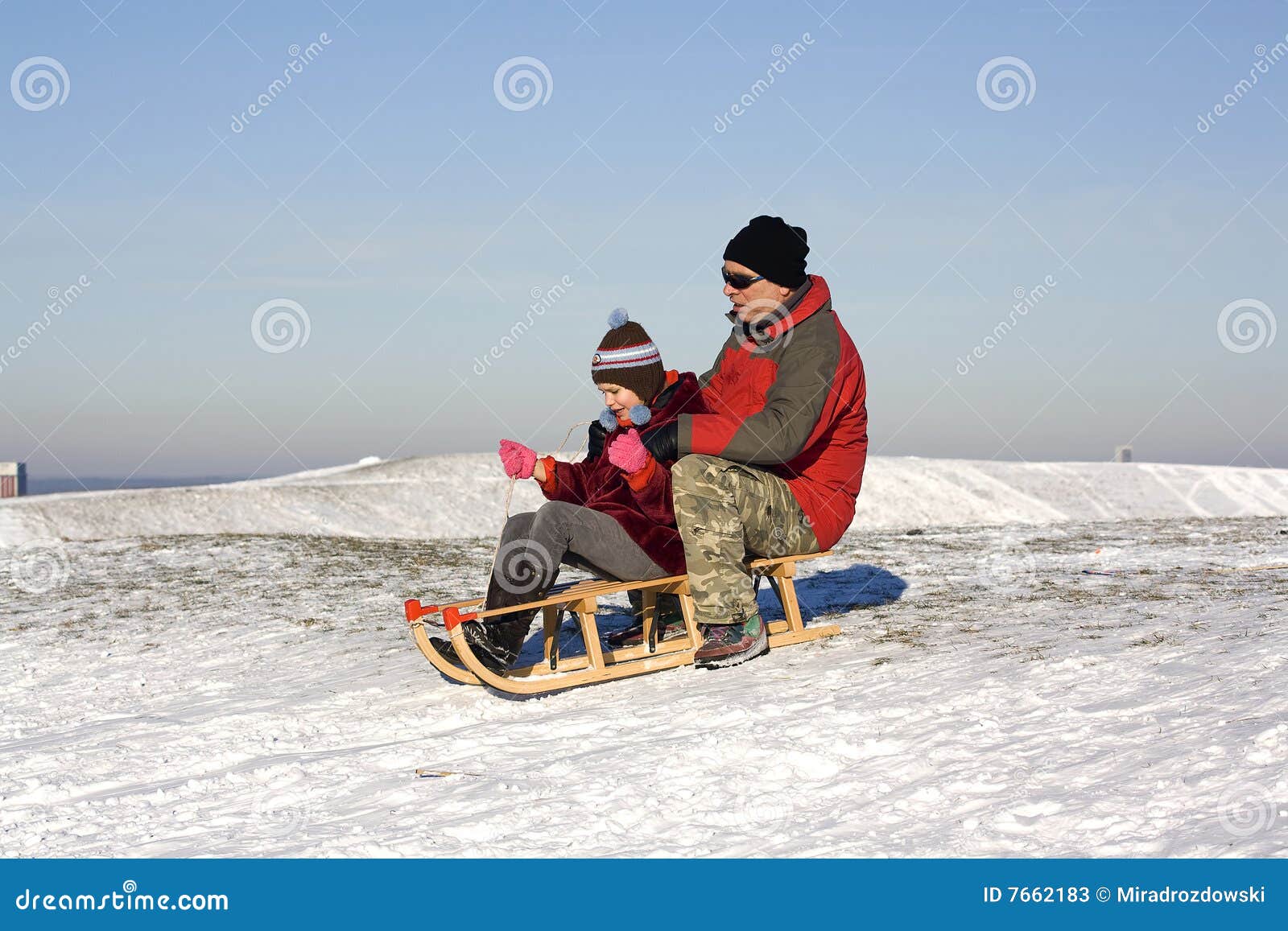 Sledging - winter fun stock image. Image of play, father - 7662183
