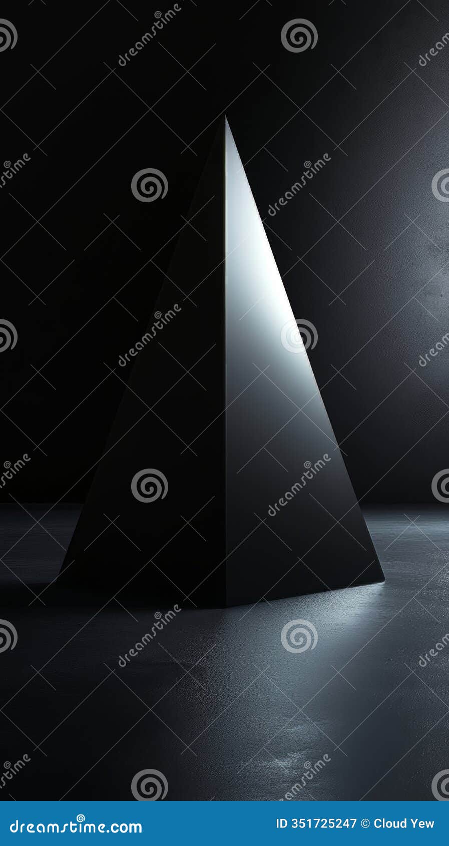 Sleek Black Pyramid in Minimalist Setting with Dramatic Lighting and ...