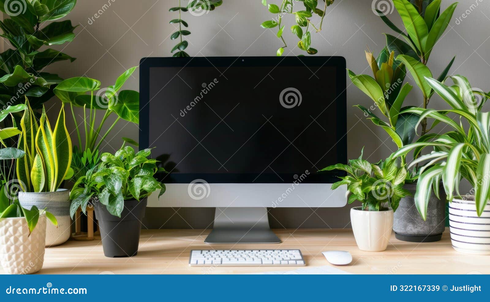 A Sleek Desk Setup with a Desktop Computer and a Wireless Keyboard ...