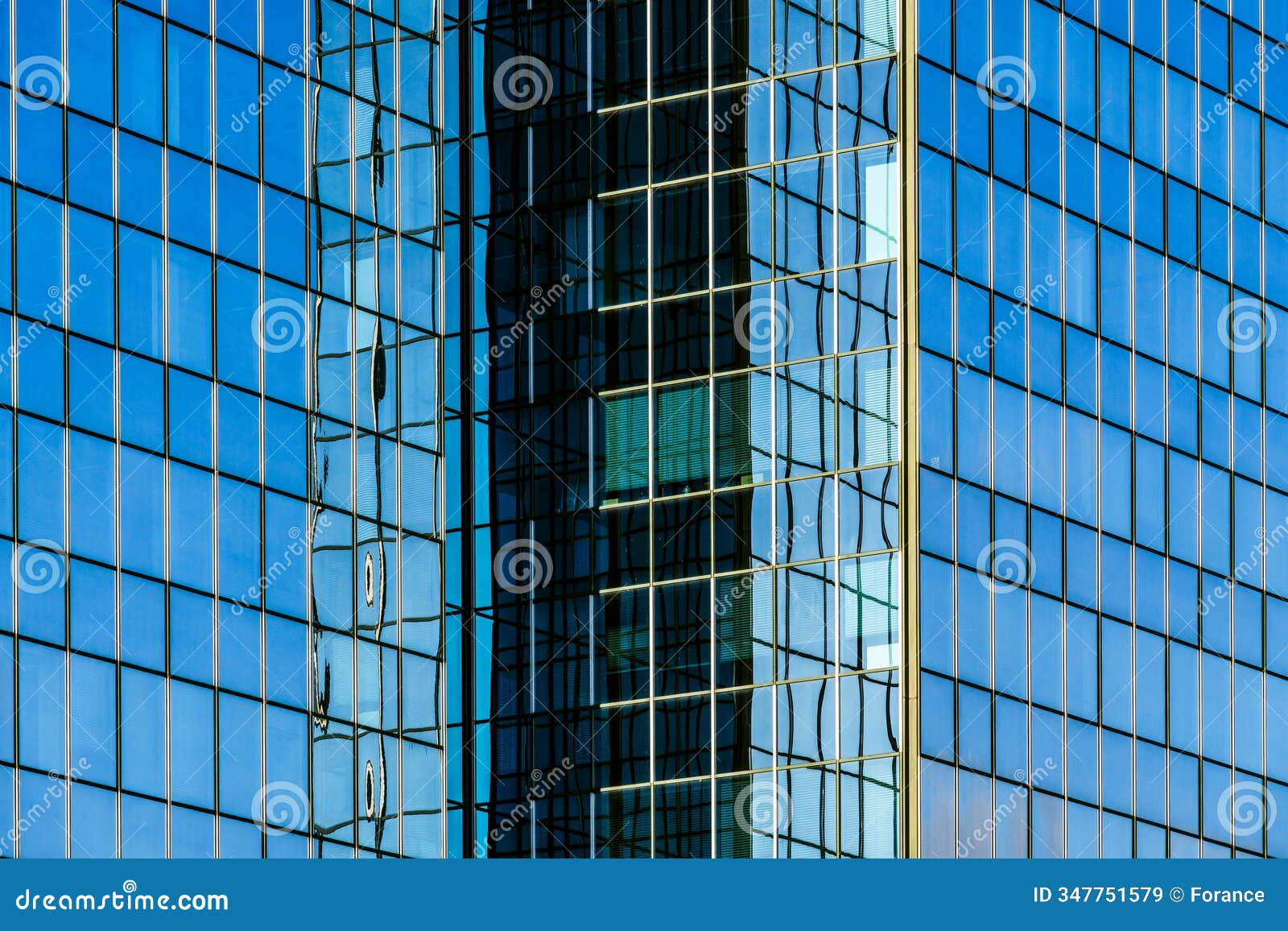 Sleek Glass Skyscraper Facade with Reflective Panels and Dynamic ...