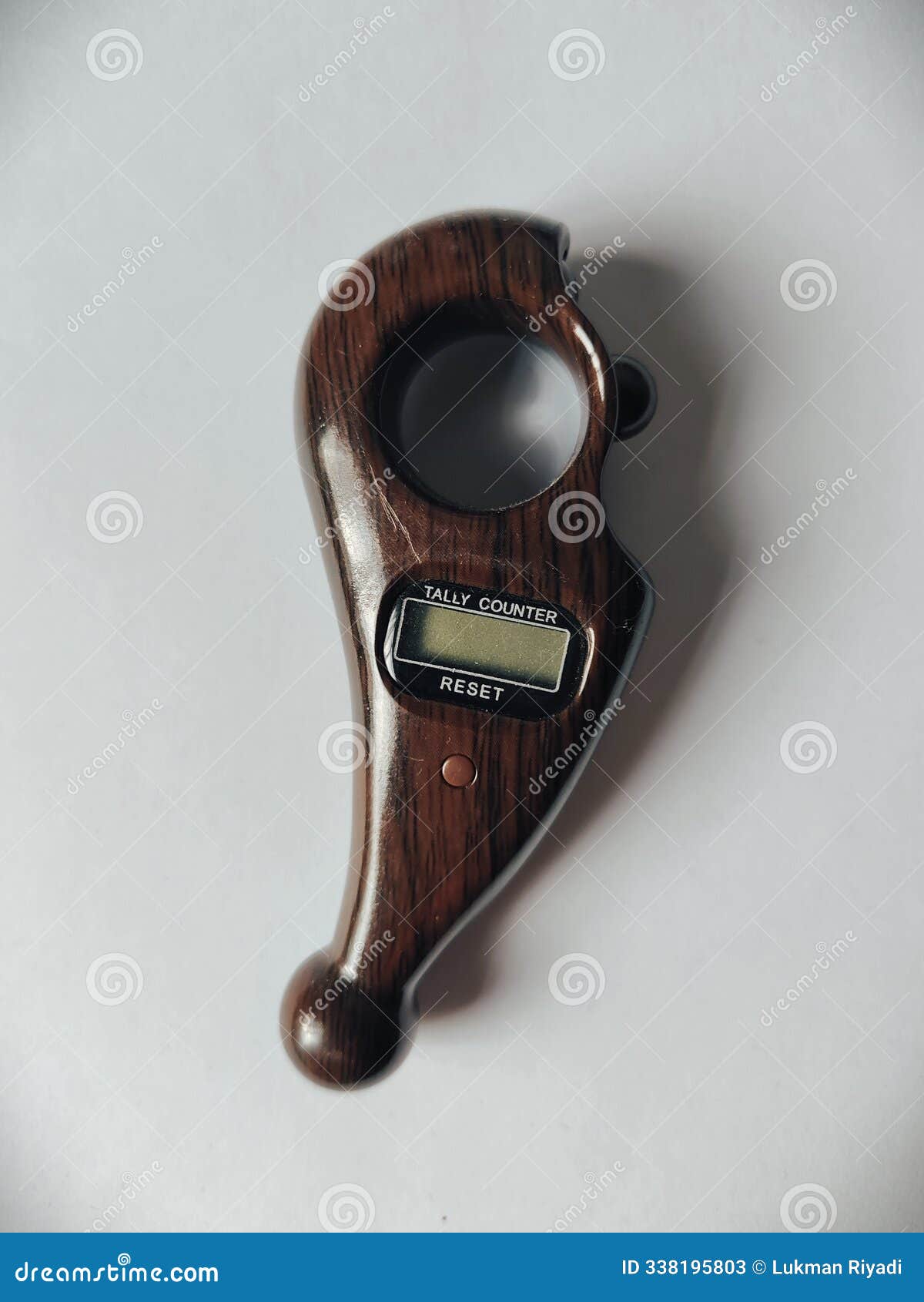 Handheld Digital Tally Counter with Wood Grain Finish Stock Image ...