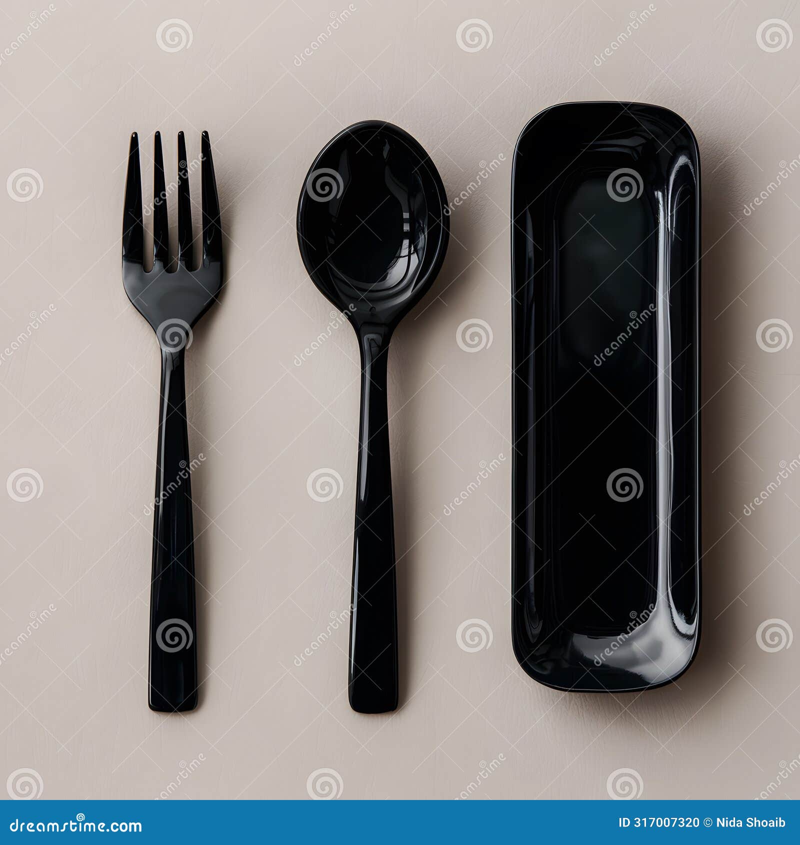 Sleek, Minimalist Trio Black Fork, Spoon, Rectangular Tray on Neutral ...