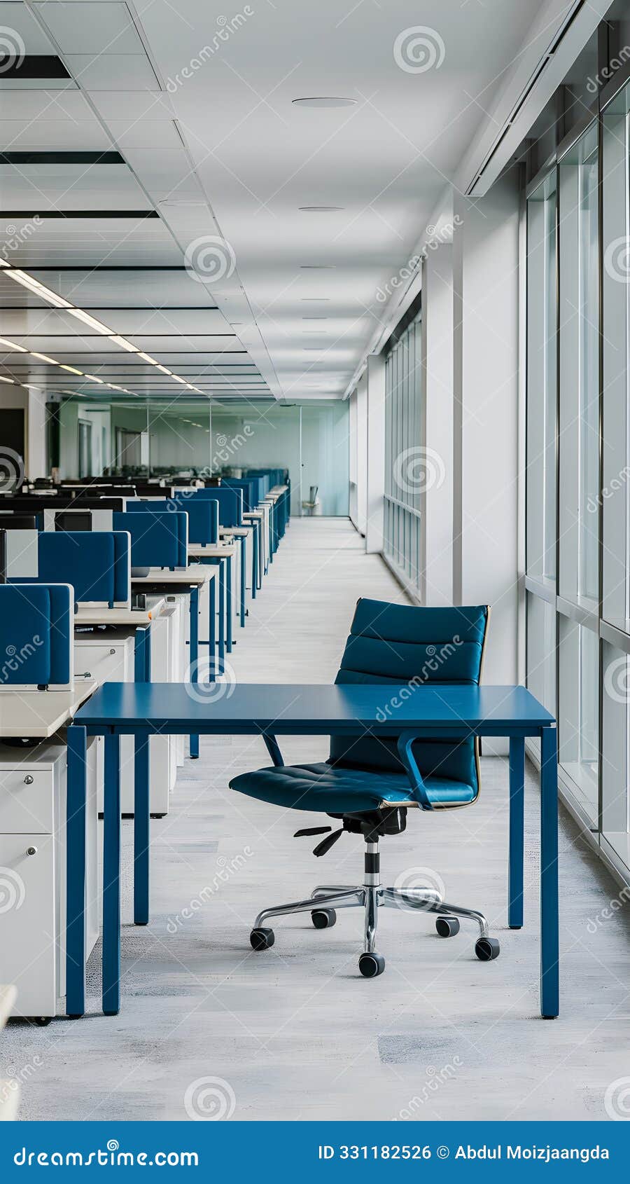 Sleek Office with Workstations, Large Windows, and Blue Desk Stock ...