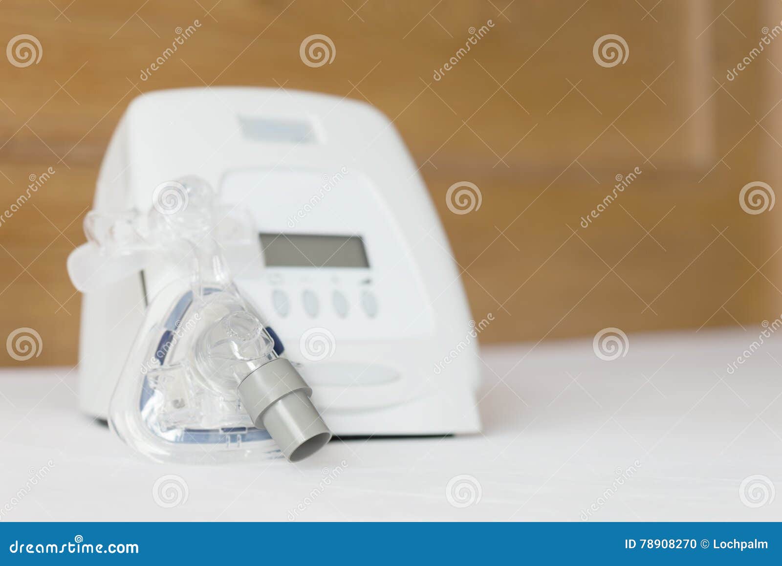 Sleep Apnea Therapy,CPAP Machine with Mask on White Bedspread Stock ...