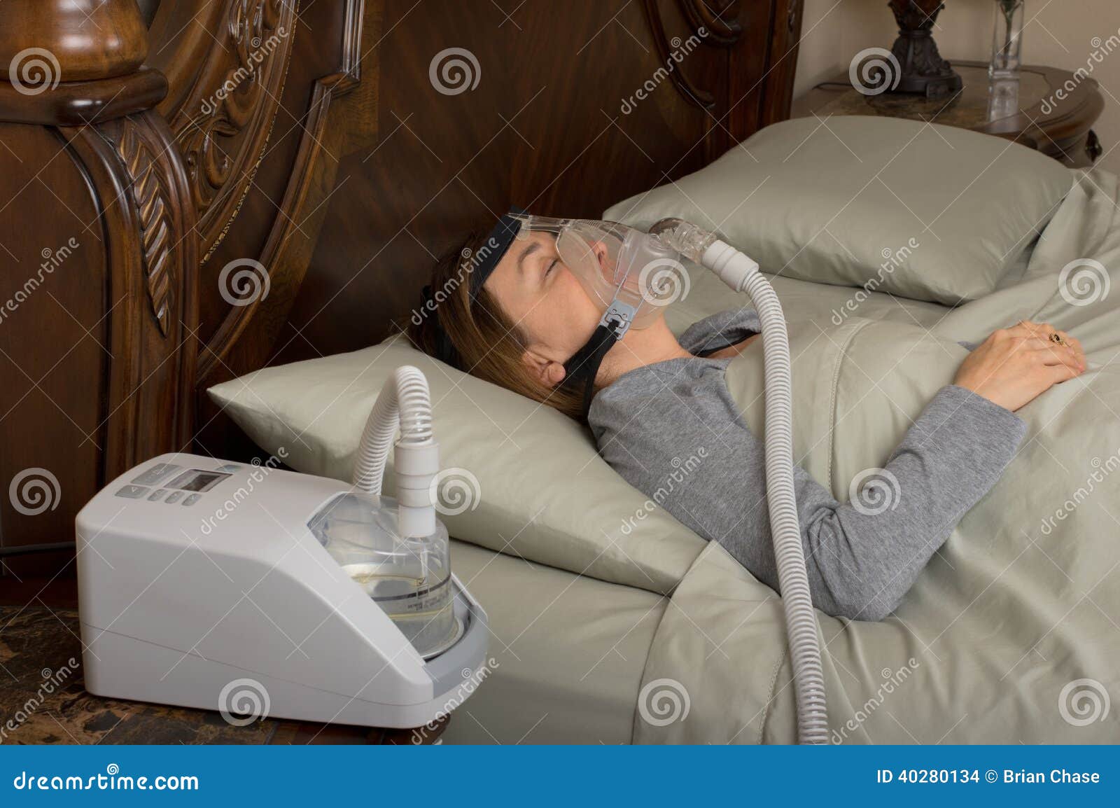 Sleep Apnea Therapy, Man Sleeping In Bed Wearing CPAP Mask. Stock Photo ...