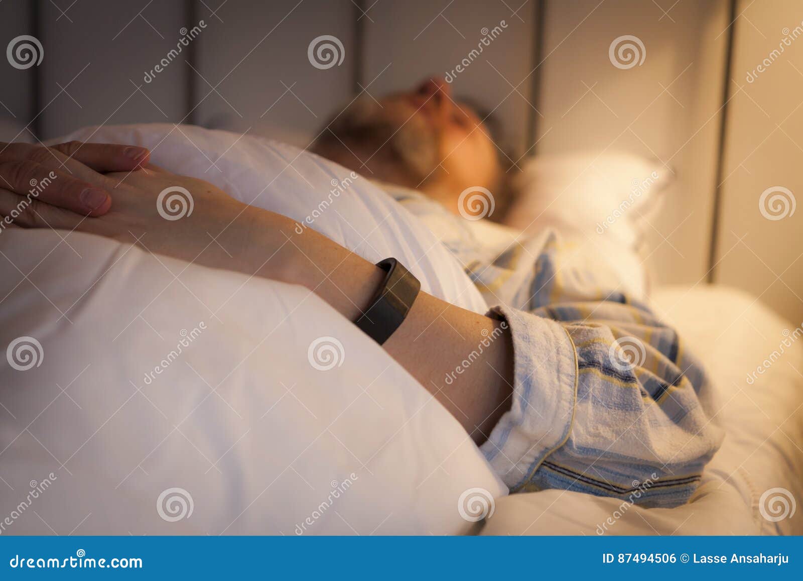 Sleep Tracking stock photo. Image of middleaged, lying - 87494506