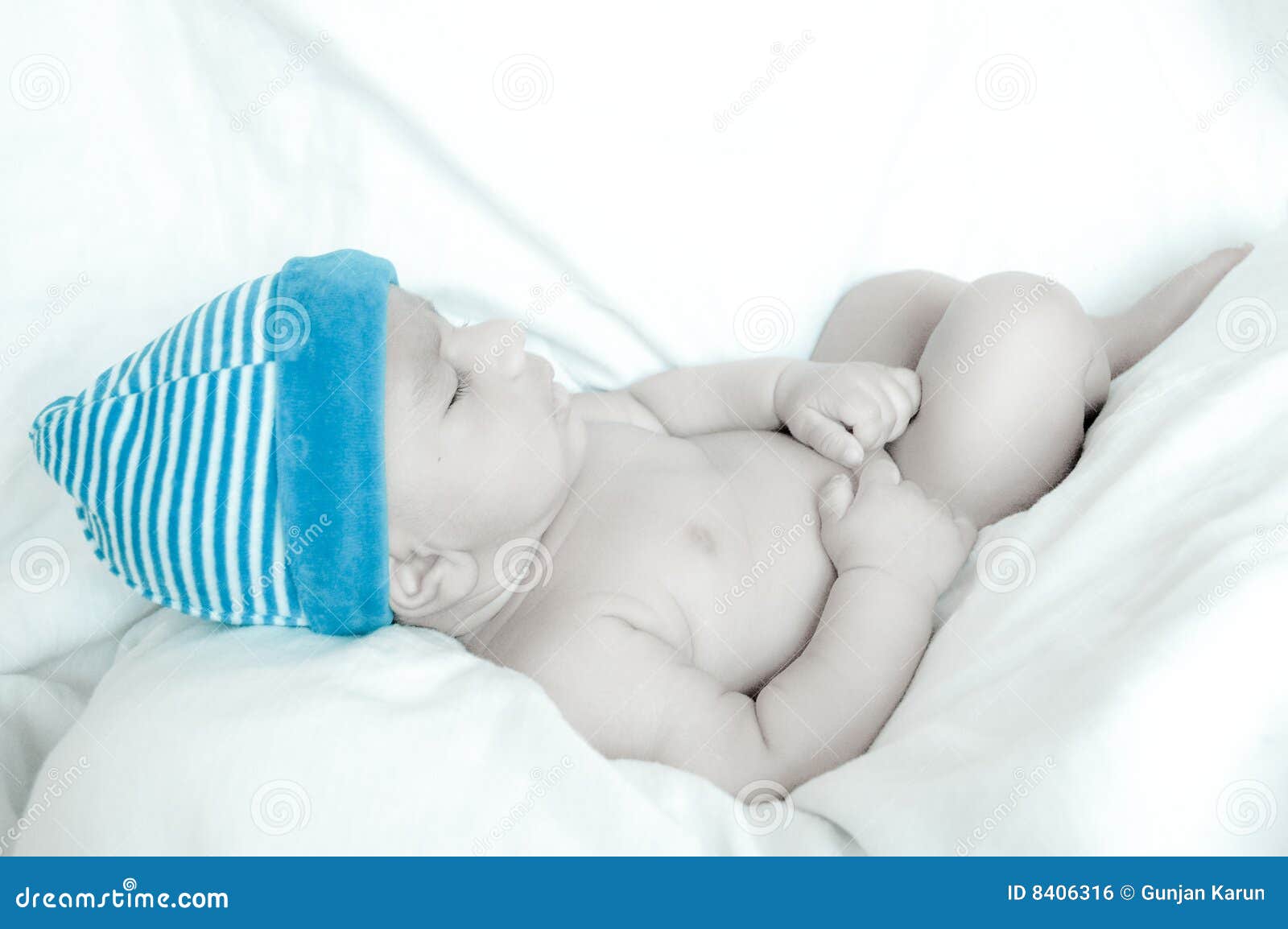 Sleeping baby with a cap stock photo. Image of gray, childhood - 8406316