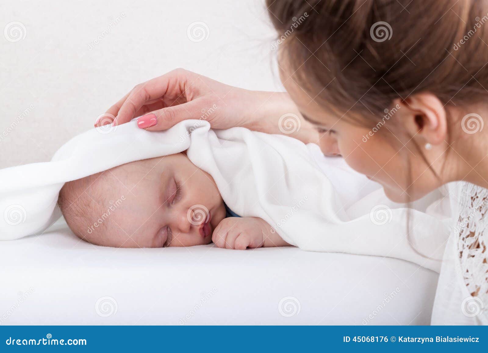Sleeping Baby and Caring Mother Stock Photo - Image of adorable, pretty ...