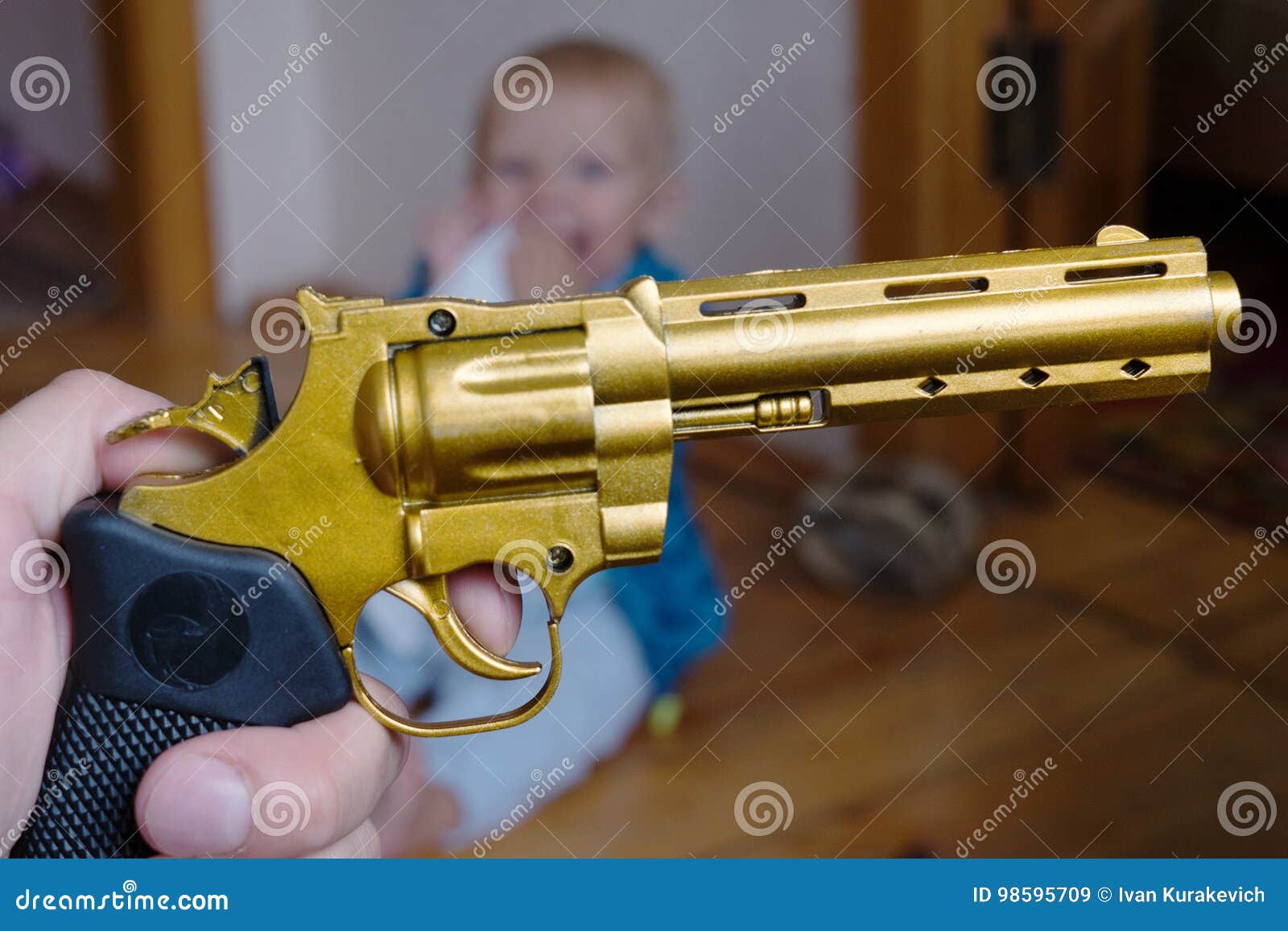 Sleeping Baby with a Gun in His Hands Stock Image - Image of grin ...