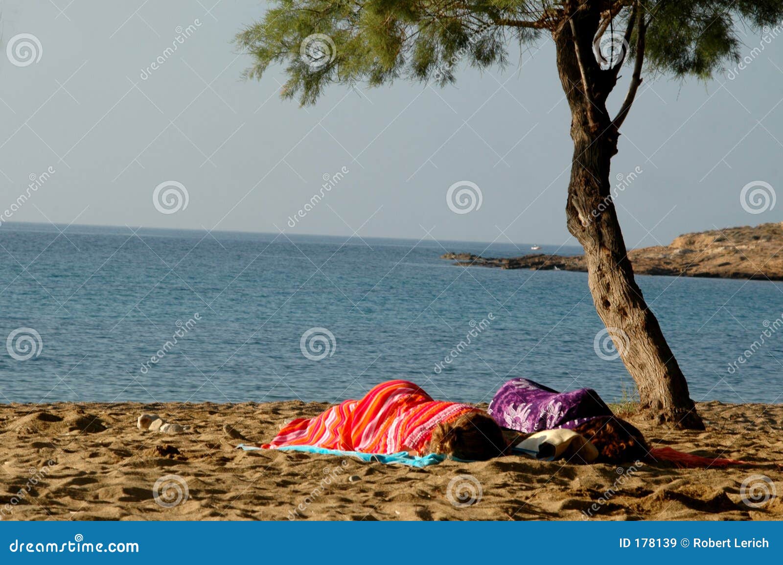 SLEEPING on the BEACH stock image. Image of peaceful, land - 178139