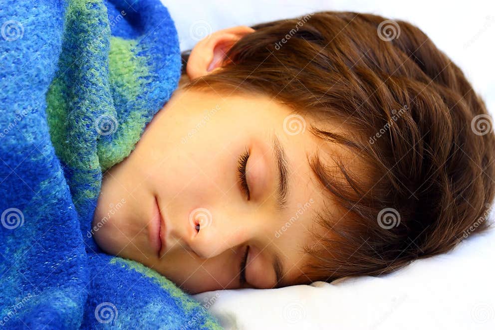 A sleeping boy stock photo. Image of blue, children, lying - 21828664