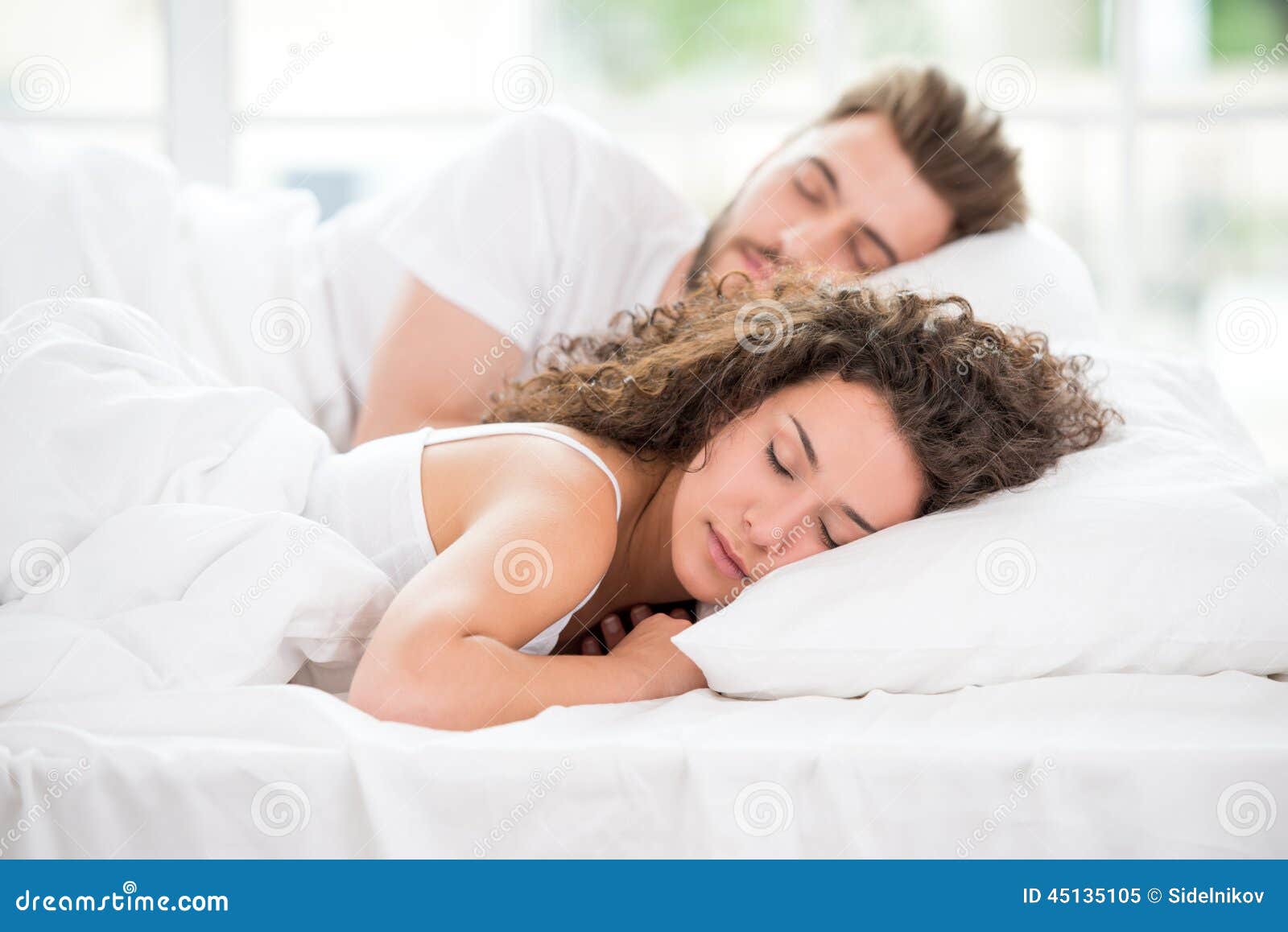 Sleeping couple in the bed stock image. Image of eyes - 45135105