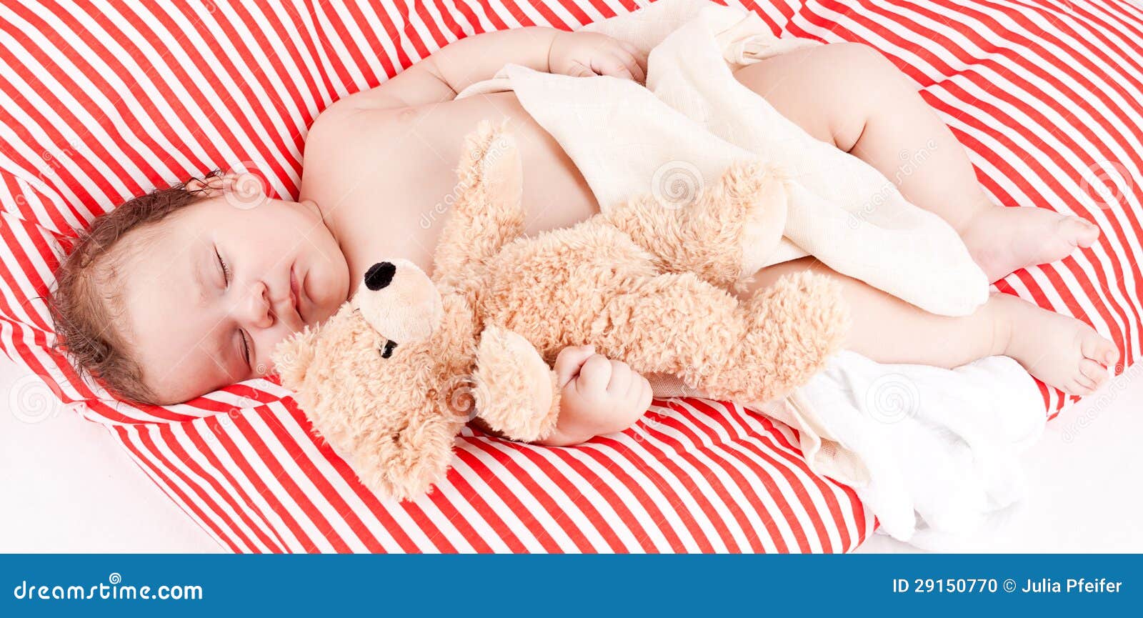 Sleeping Cute Little Baby on Red and White Stripes Pillow Stock Photo ...