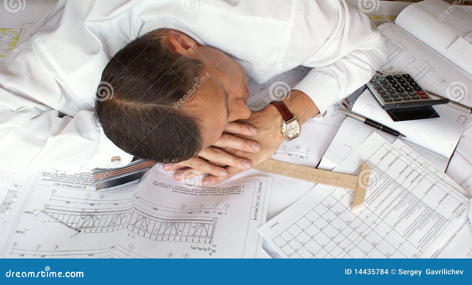 Sleeping engineer- planner stock photo. Image of finger - 14435784