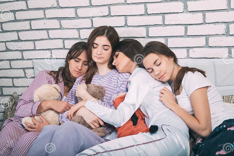 Sleeping Group of Young People on the Bed. Stock Photo - Image of happy ...