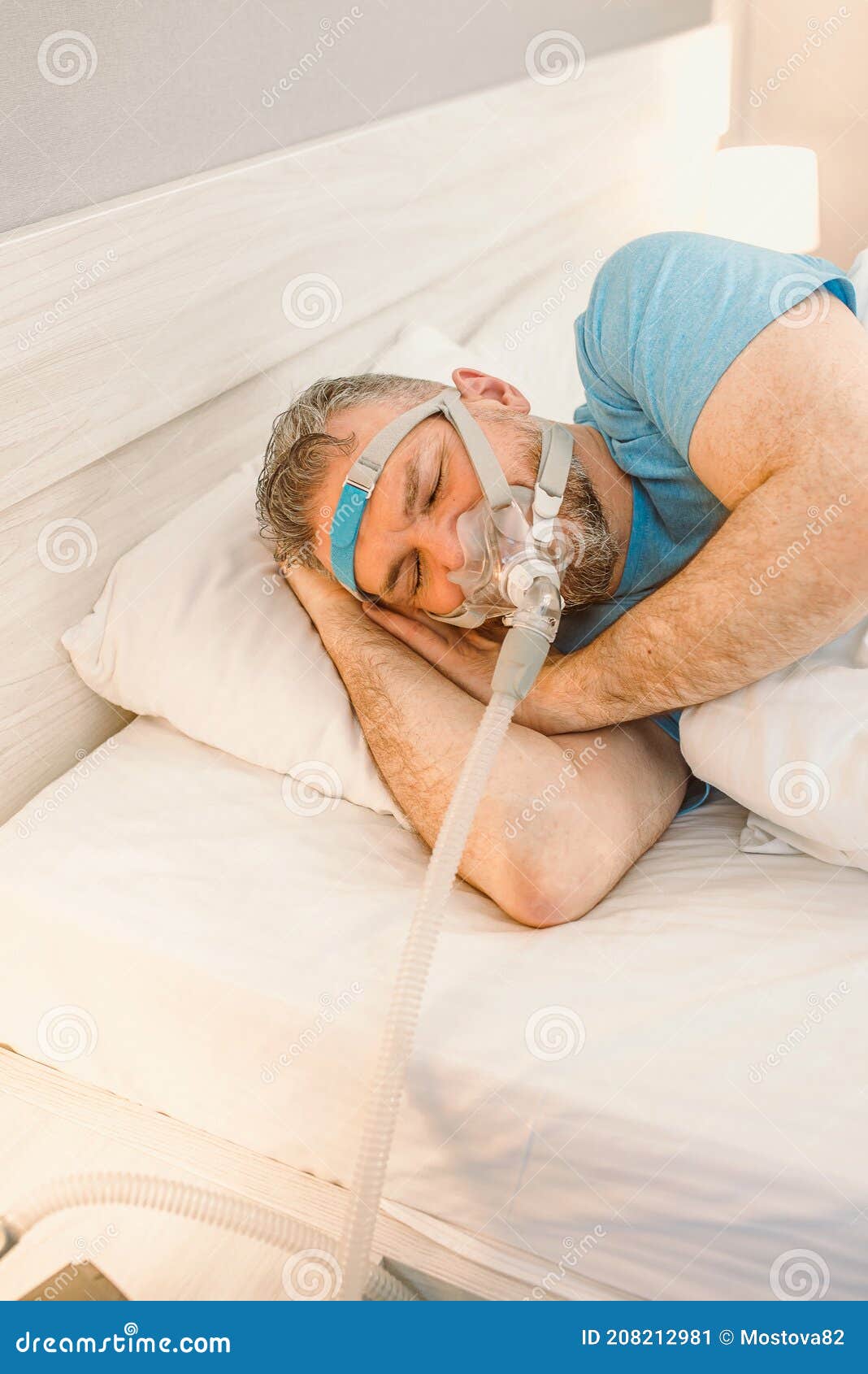 Sleeping Man with Chronic Breathing Issues Considers Using CPAP Machine ...