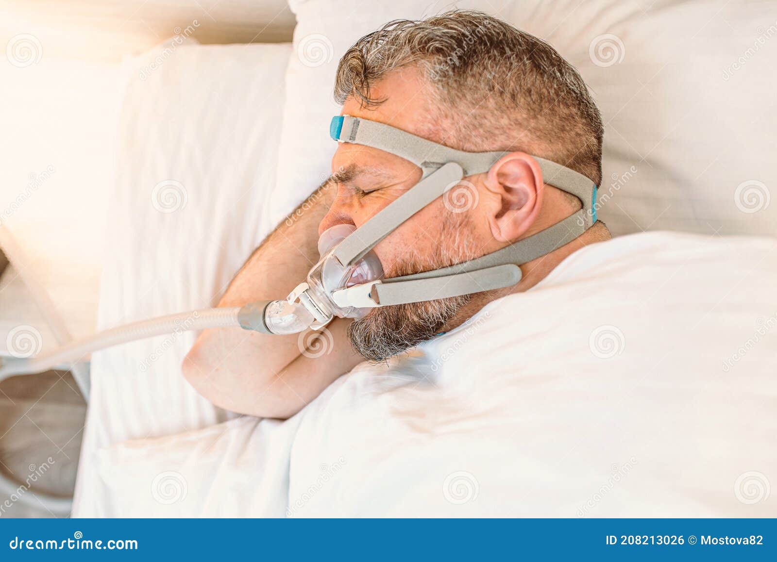 Sleeping Man With Chronic Breathing Issues Considers Using CPAP Machine ...