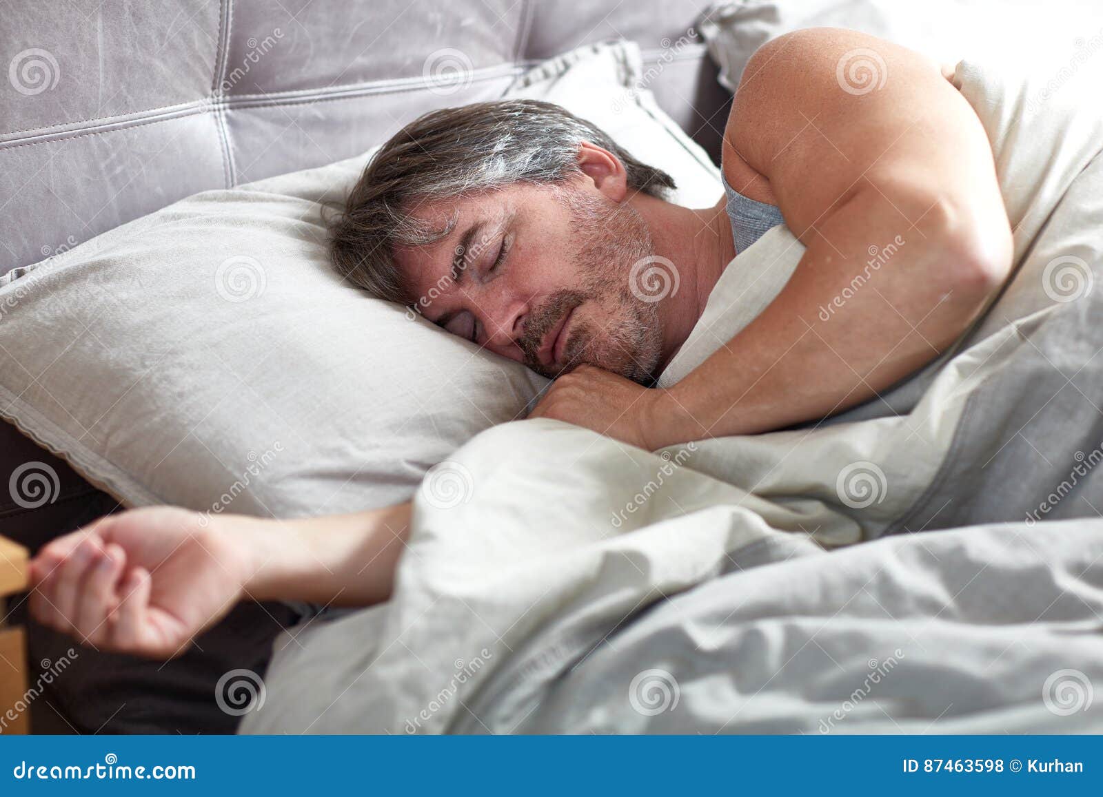 Sleeping man stock photo. Image of cushion, lifestyle - 87463598