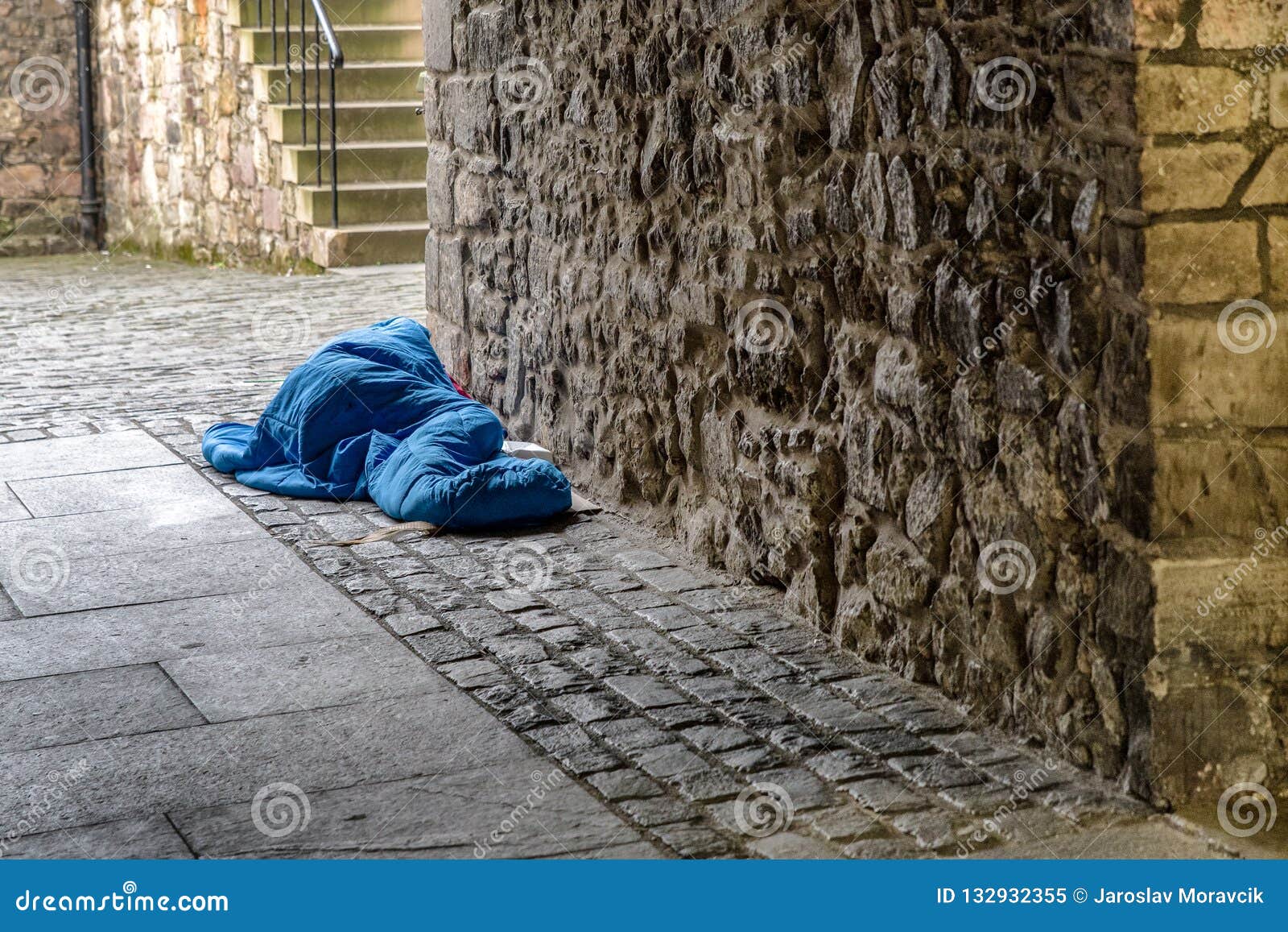 Sleeping man homeless stock image. Image of sidewalk - 132932355