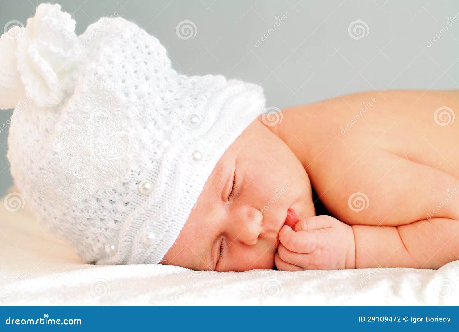 Sleeping Newborn Baby Girl in White Hat Stock Photo - Image of bedtime ...