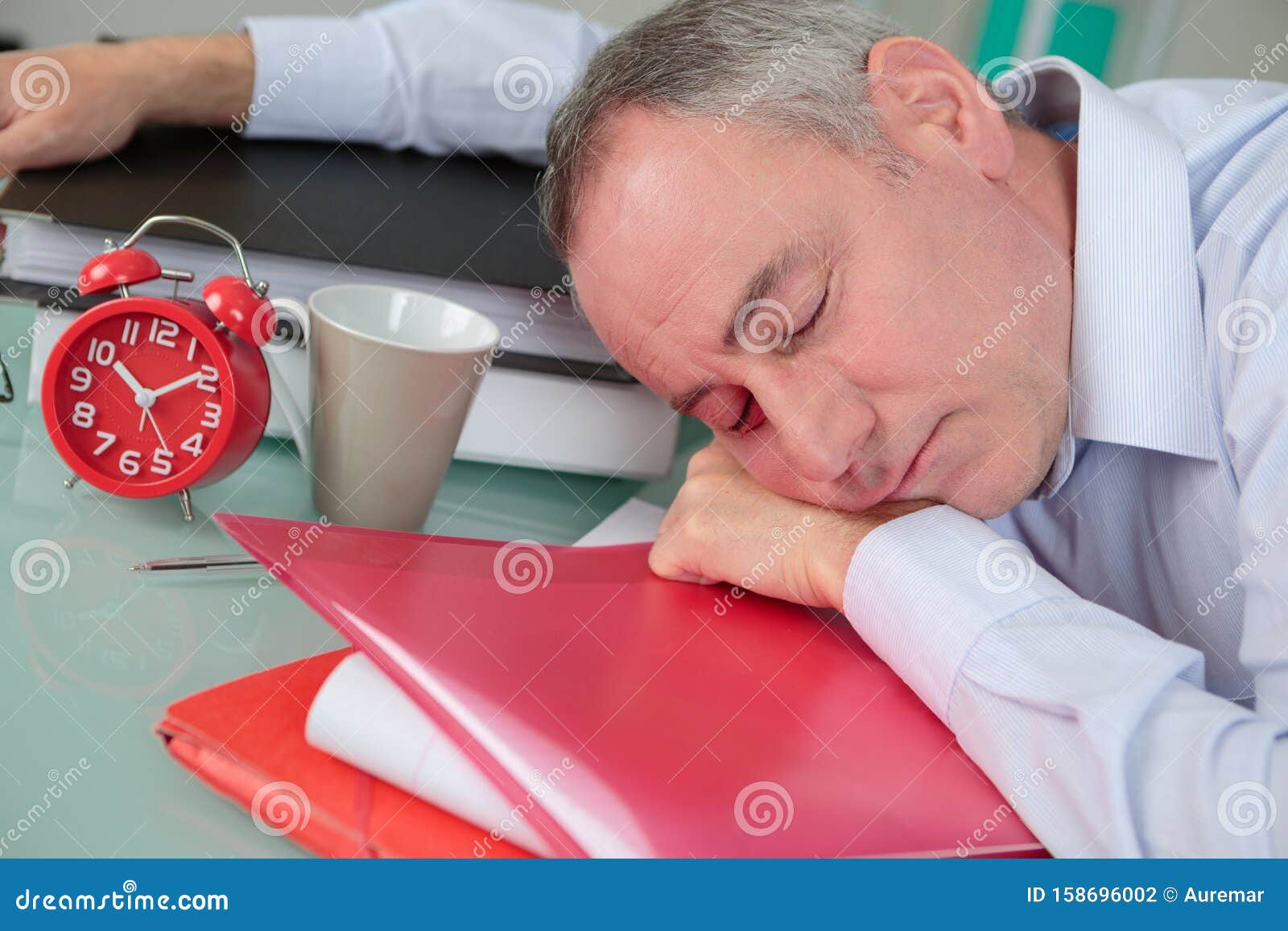 Sleeping in Office with Alarm Clock on Side Stock Photo - Image of ...