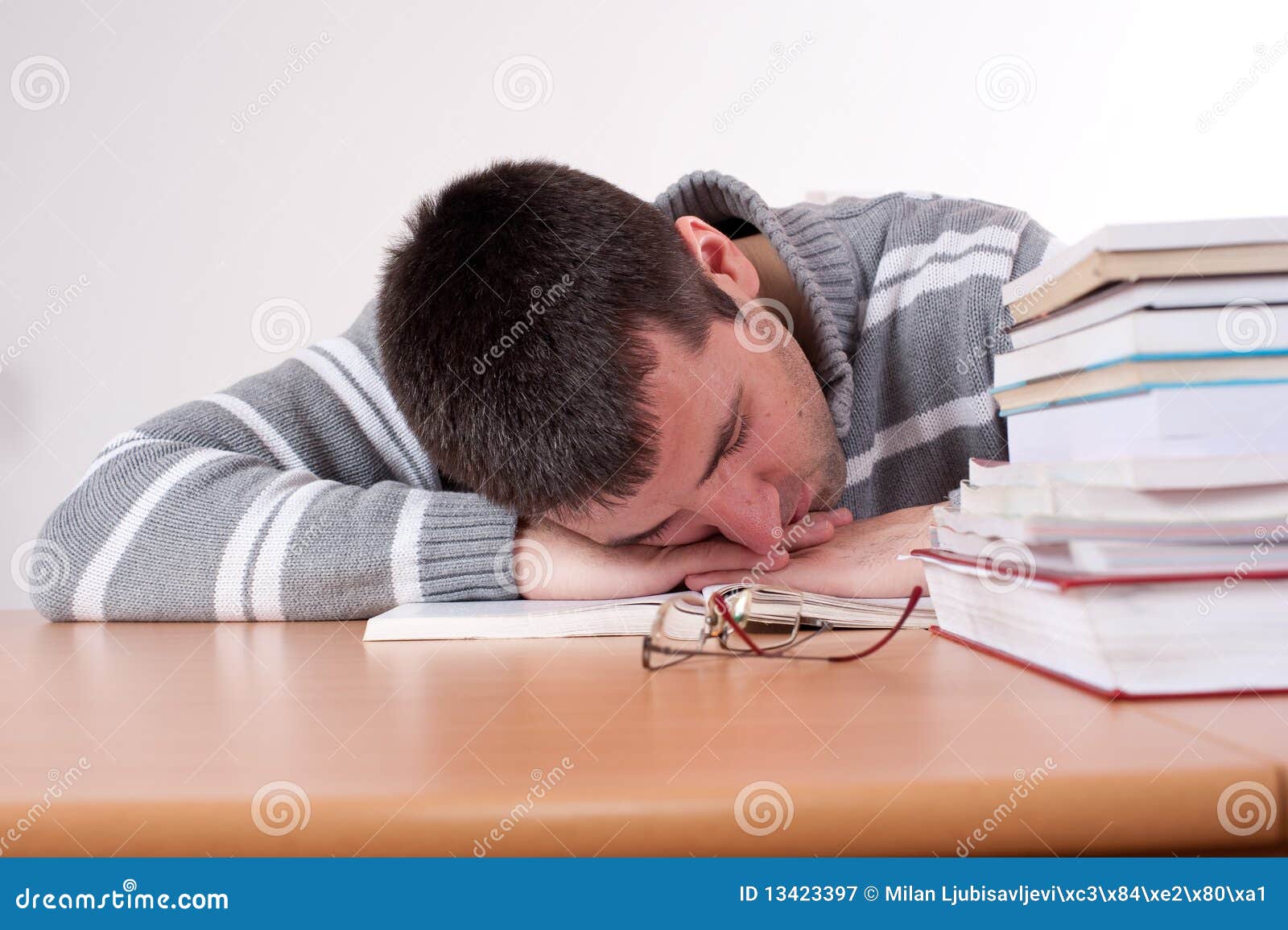 Sleeping while Studying stock image. Image of white, tired - 13423397
