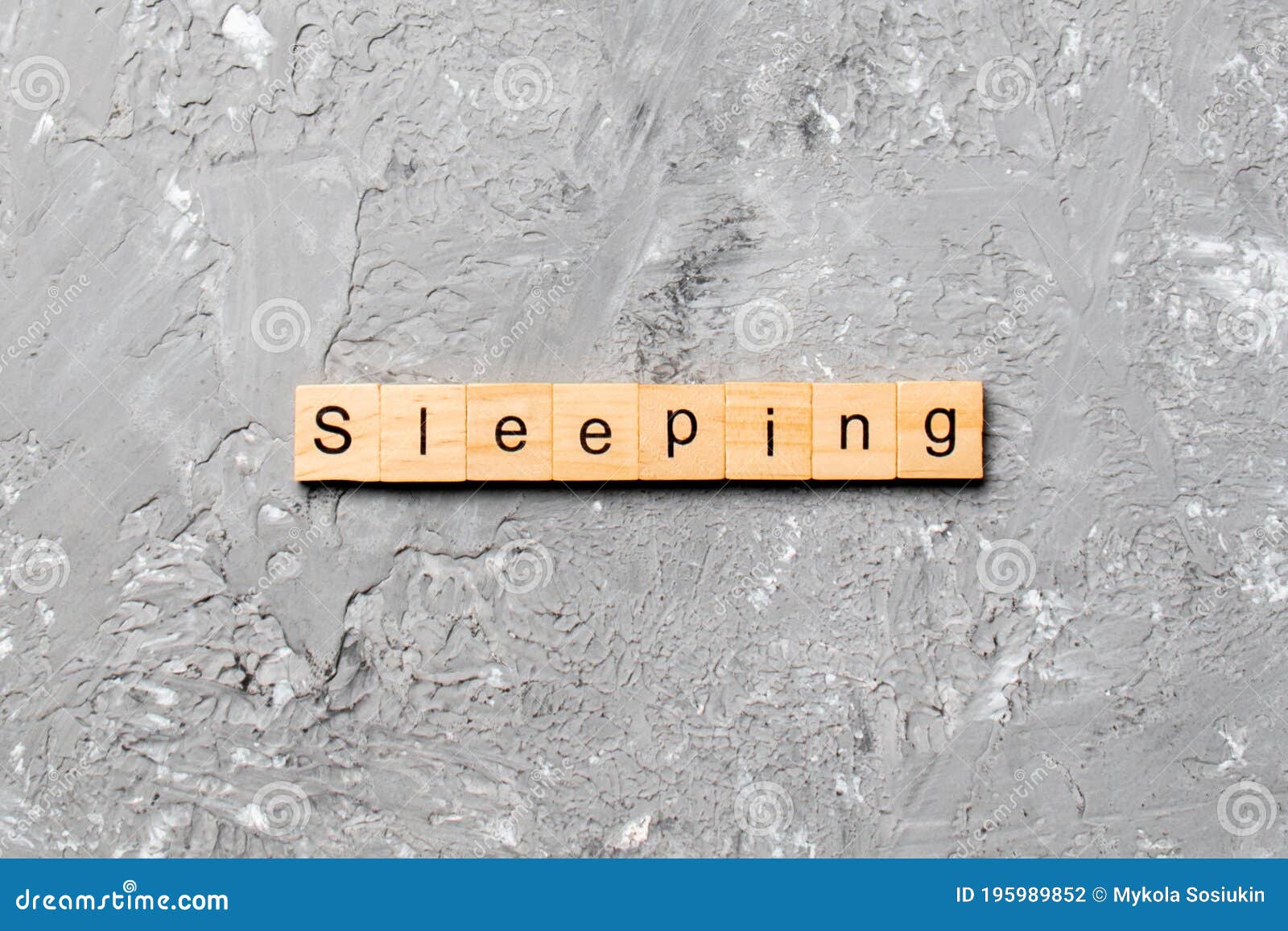SLEEPING Word Written on Wood Block. SLEEPING Text on Cement Table for ...