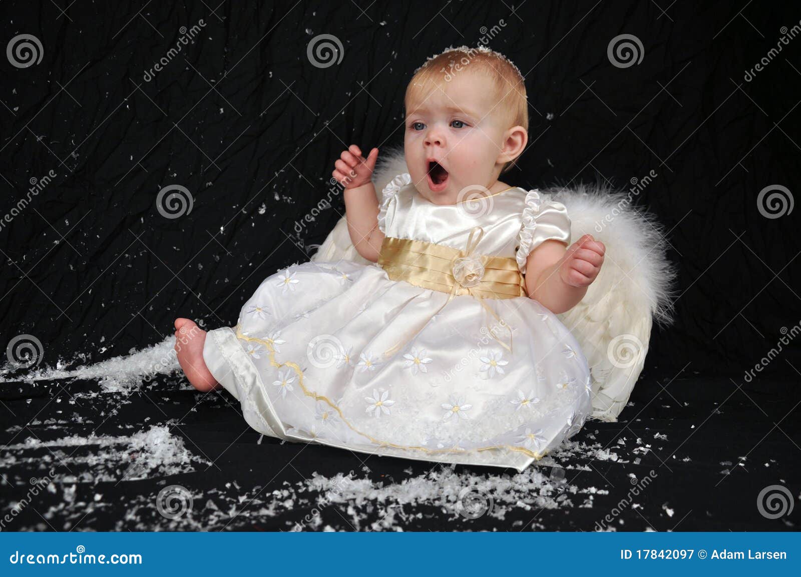 Sleepy angel in the snow stock image. Image of crooked - 17842097