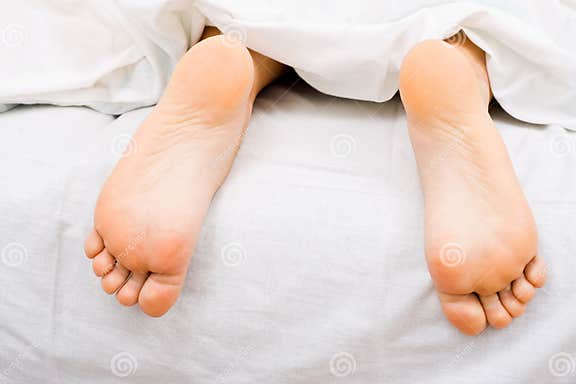 Sleepy feet stock image. Image of indoor, brunette, feet - 7397439