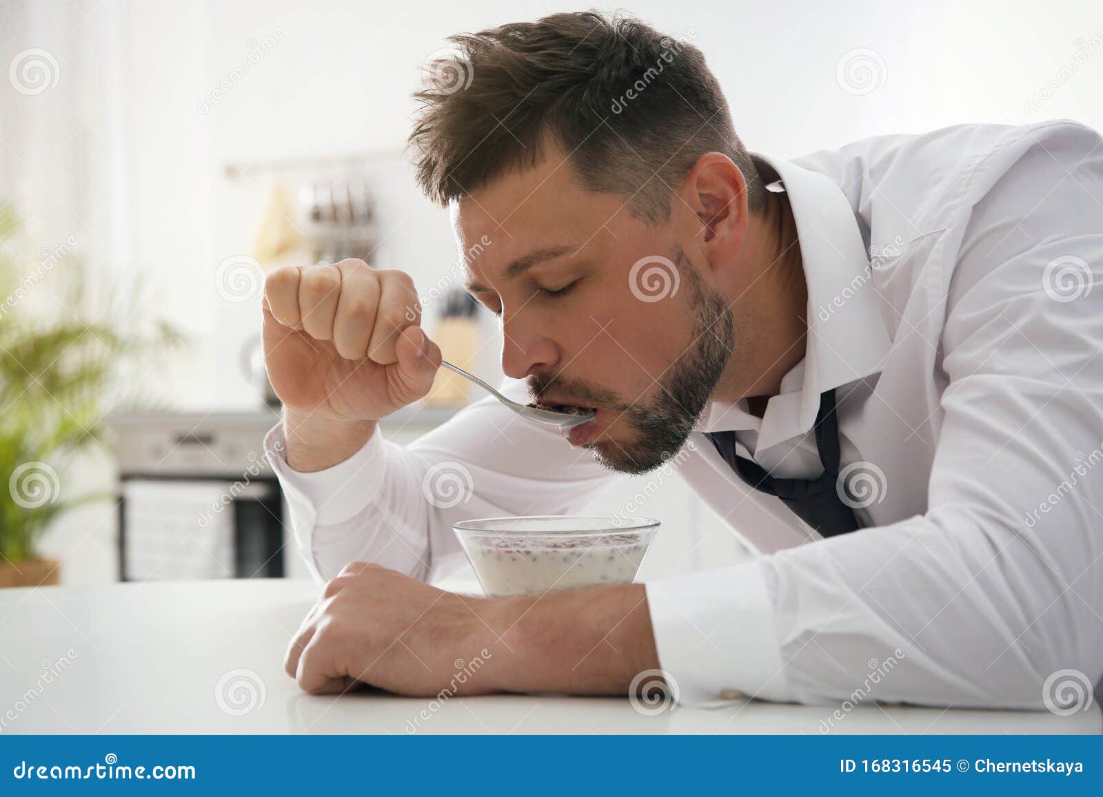 Sleepy Man Eating Breakfast at Home in Morning Stock Image - Image of ...