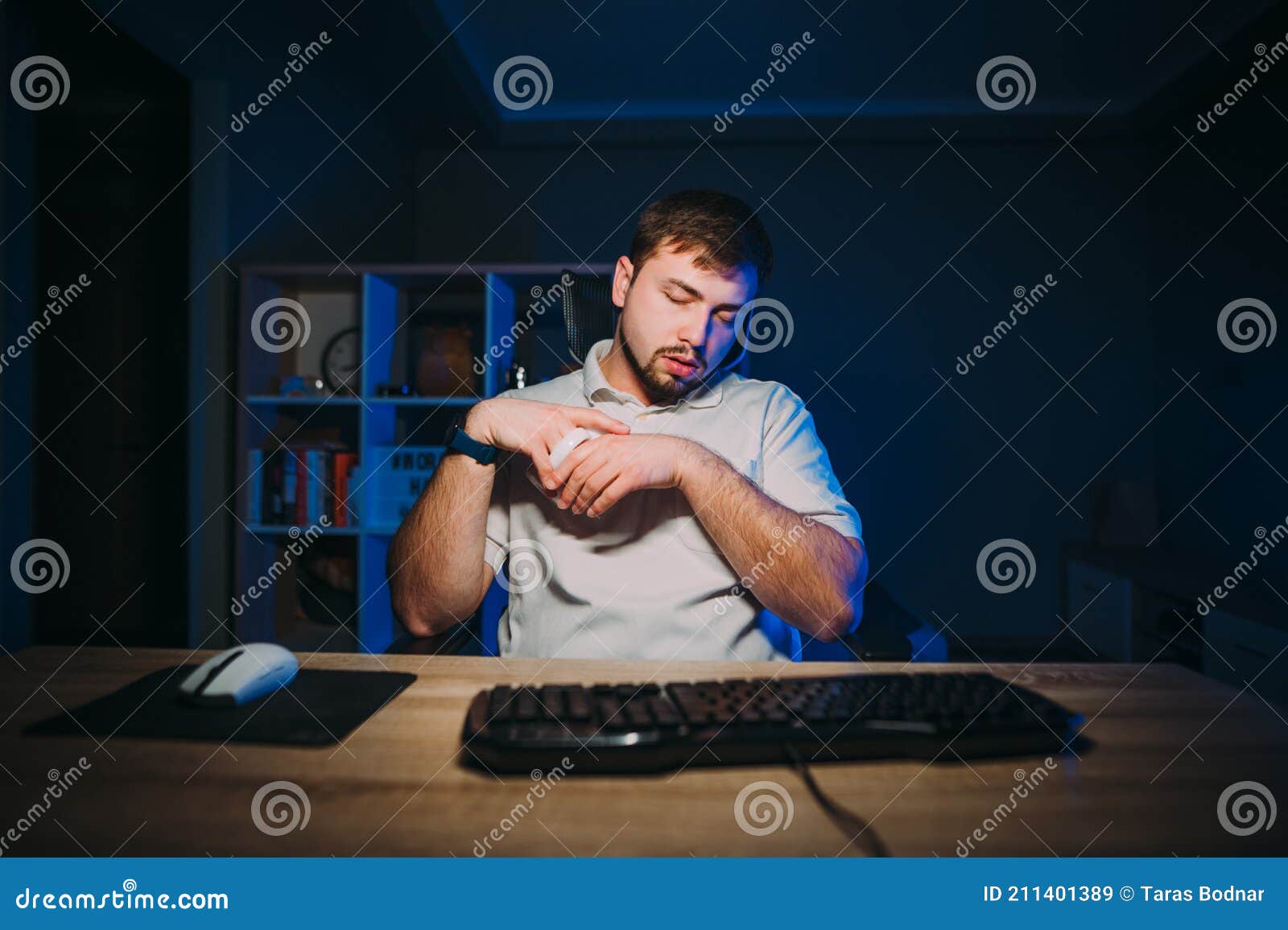 Sleepy Man Sleeps at the Computer Desk during Night Work. Tired ...