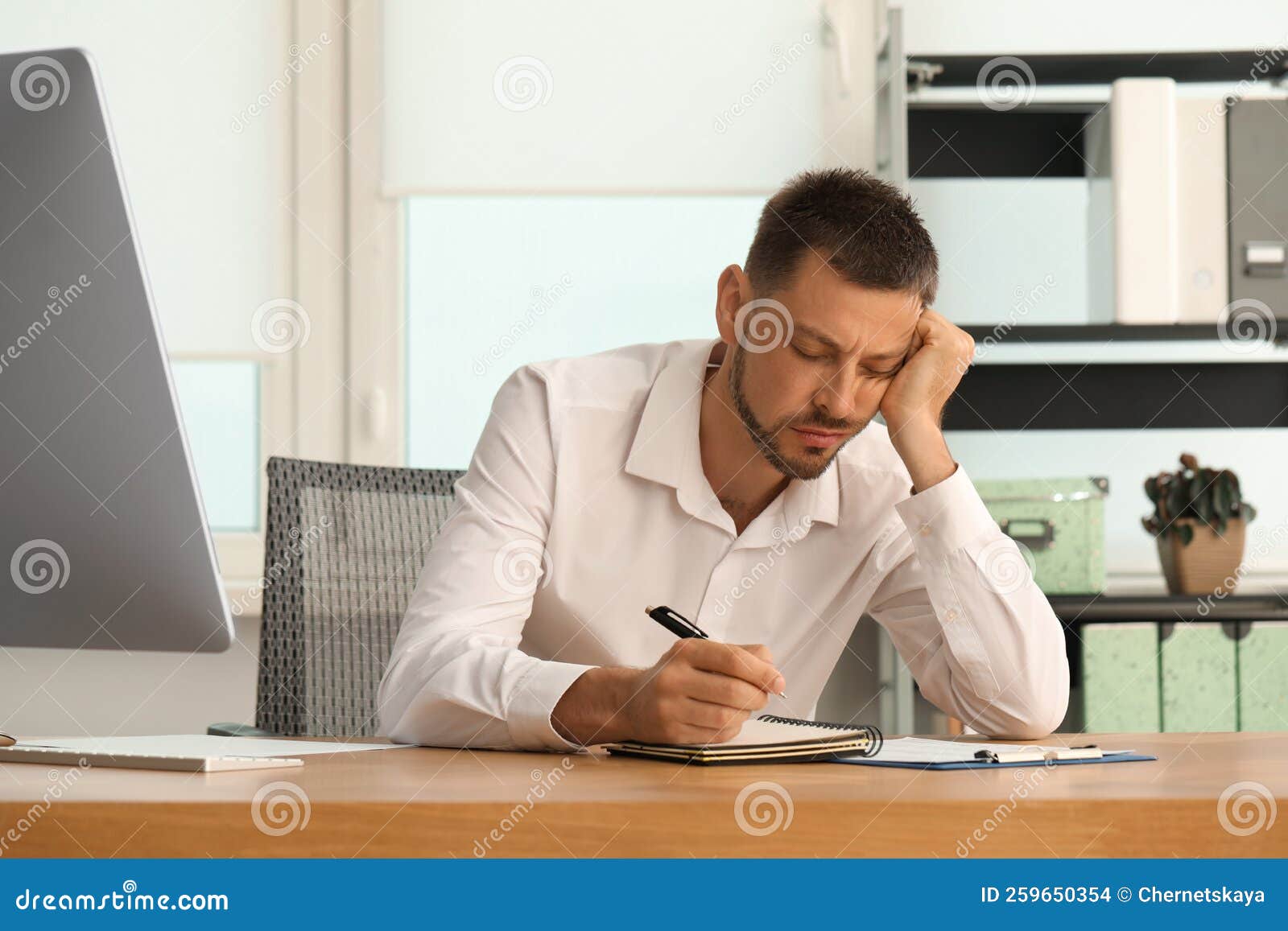 Sleepy Man Snoozing at Workplace in Office Stock Photo - Image of ...