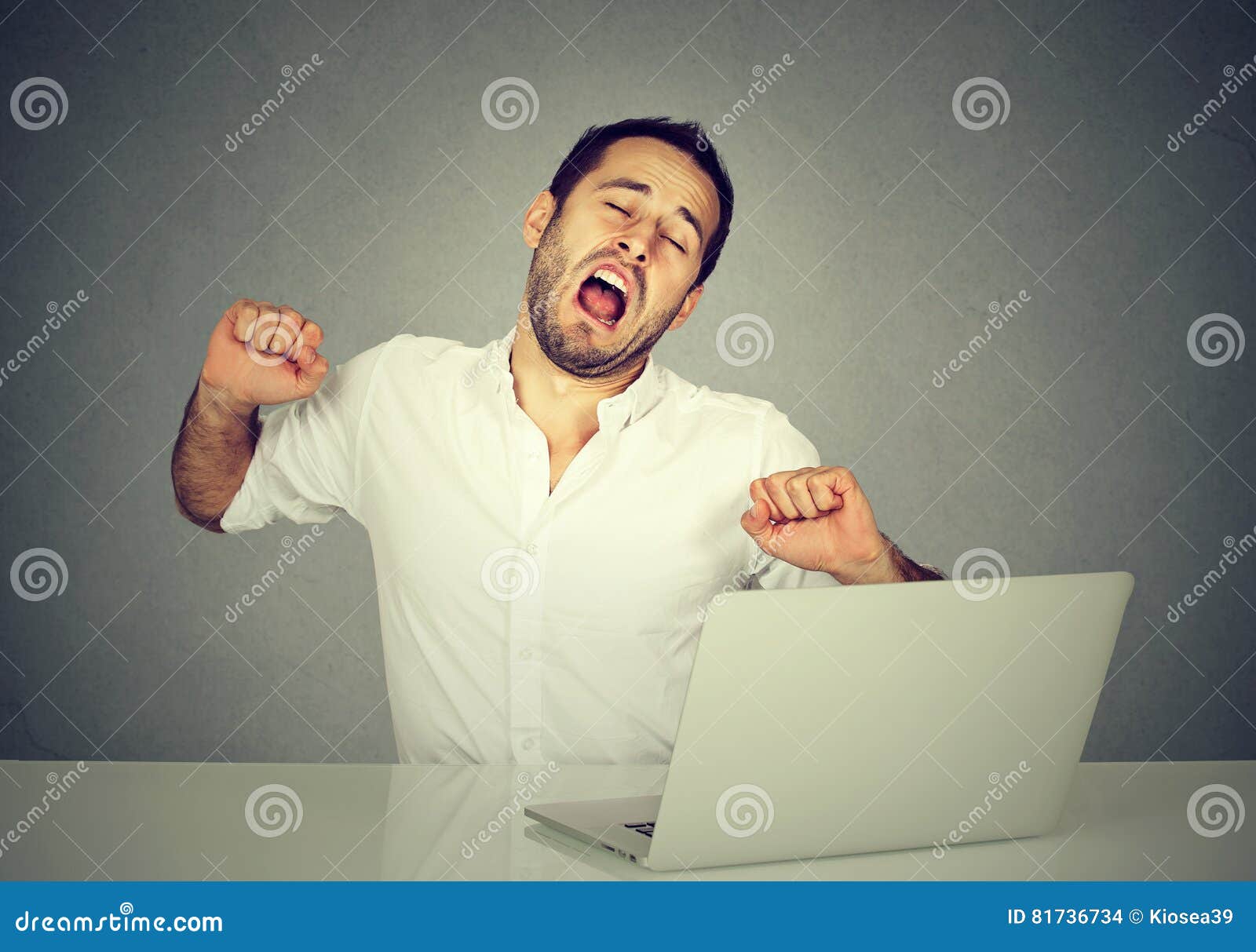 Sleepy Worker with Laptop Computer Yawning Stock Photo - Image of ...