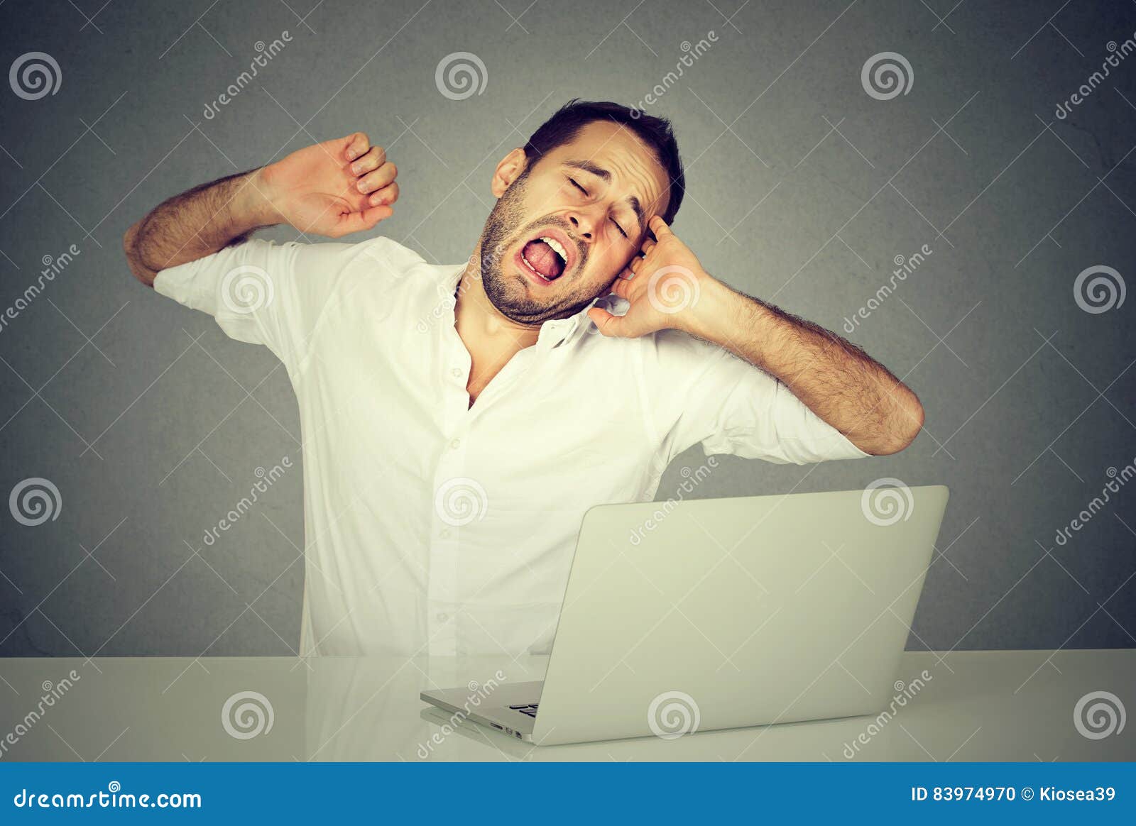 Sleepy Worker with Laptop Computer Yawning Stock Photo - Image of ...
