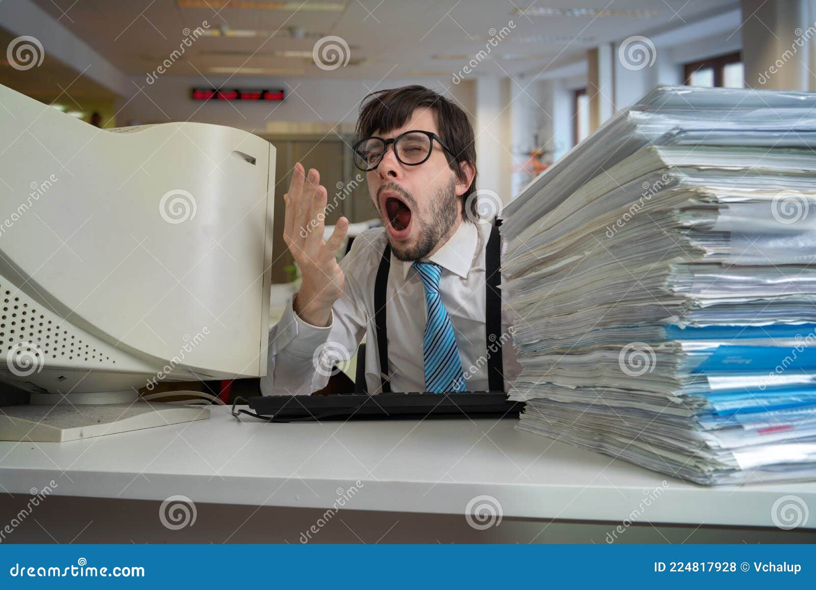 Guy On Sleepy Yawning Face Laying On Edge Of Bed On White Sheets ...