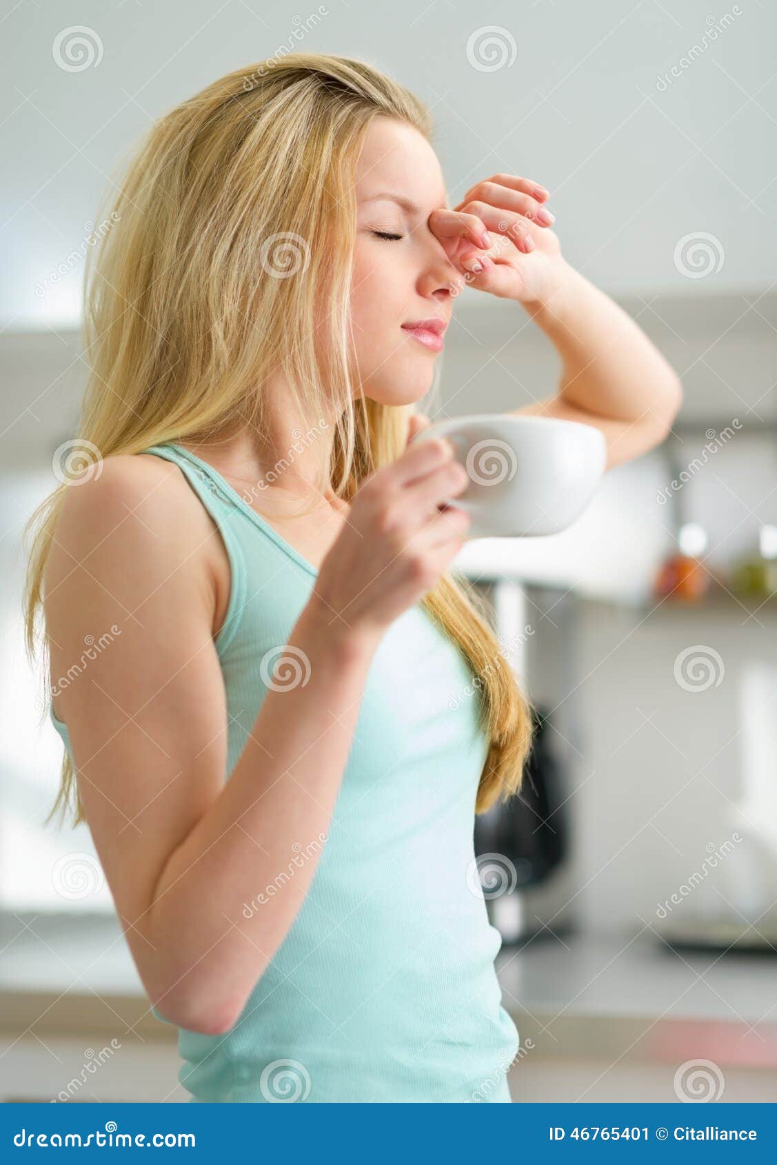 Sleepy Young Woman with Cup of Coffee in Kitchen Stock Image - Image of ...