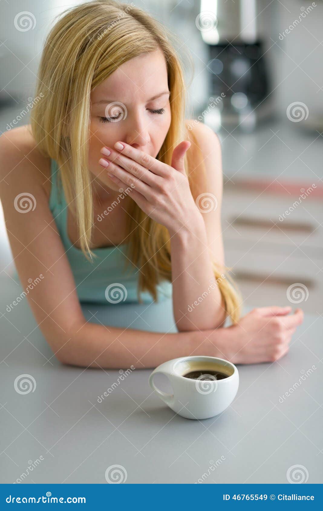 Sleepy Young Woman with Cup of Coffee in Kitchen Stock Image - Image of ...