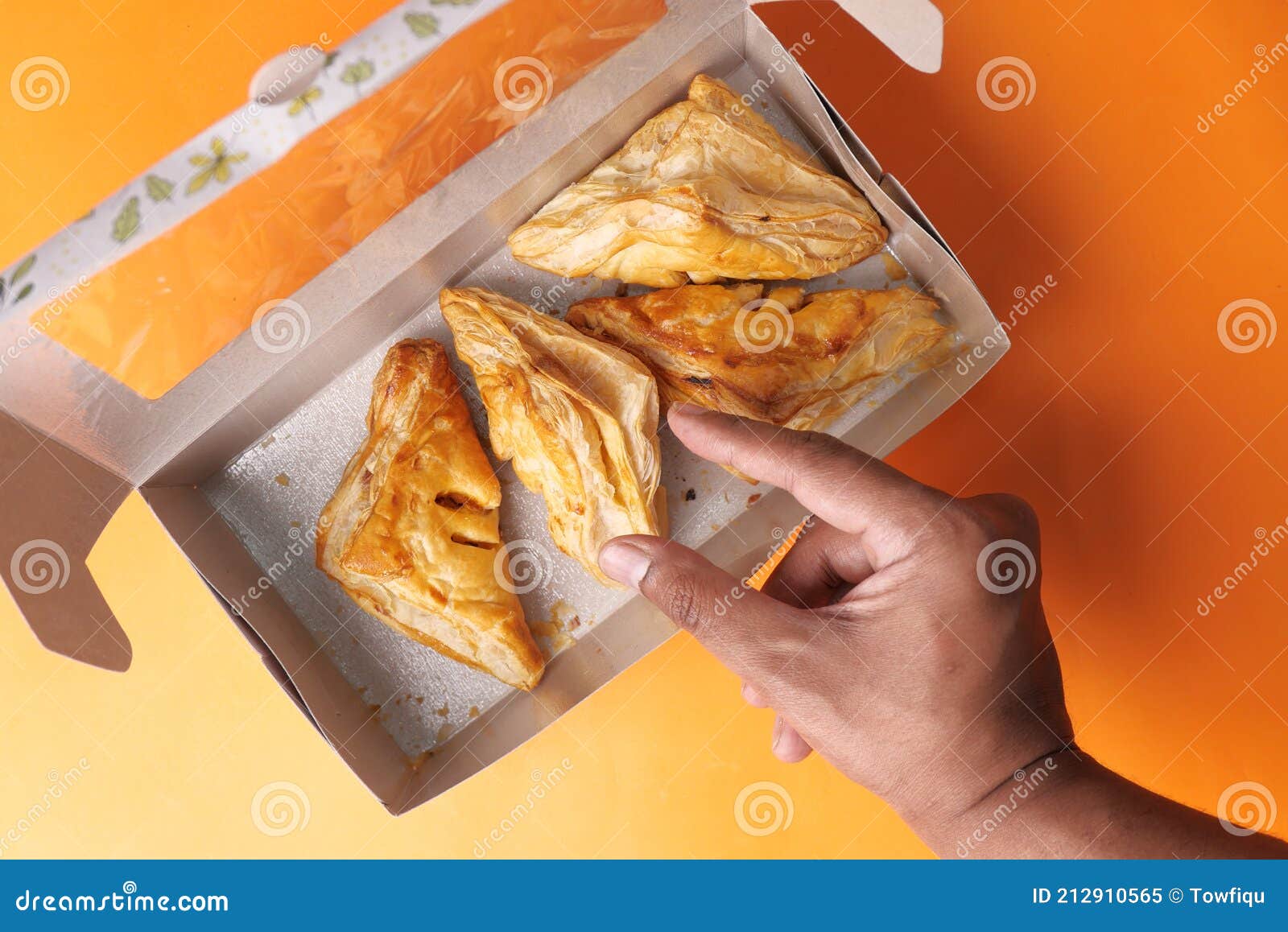 Slice of Beef Sandwich in a Packet on Color Background Stock Image ...