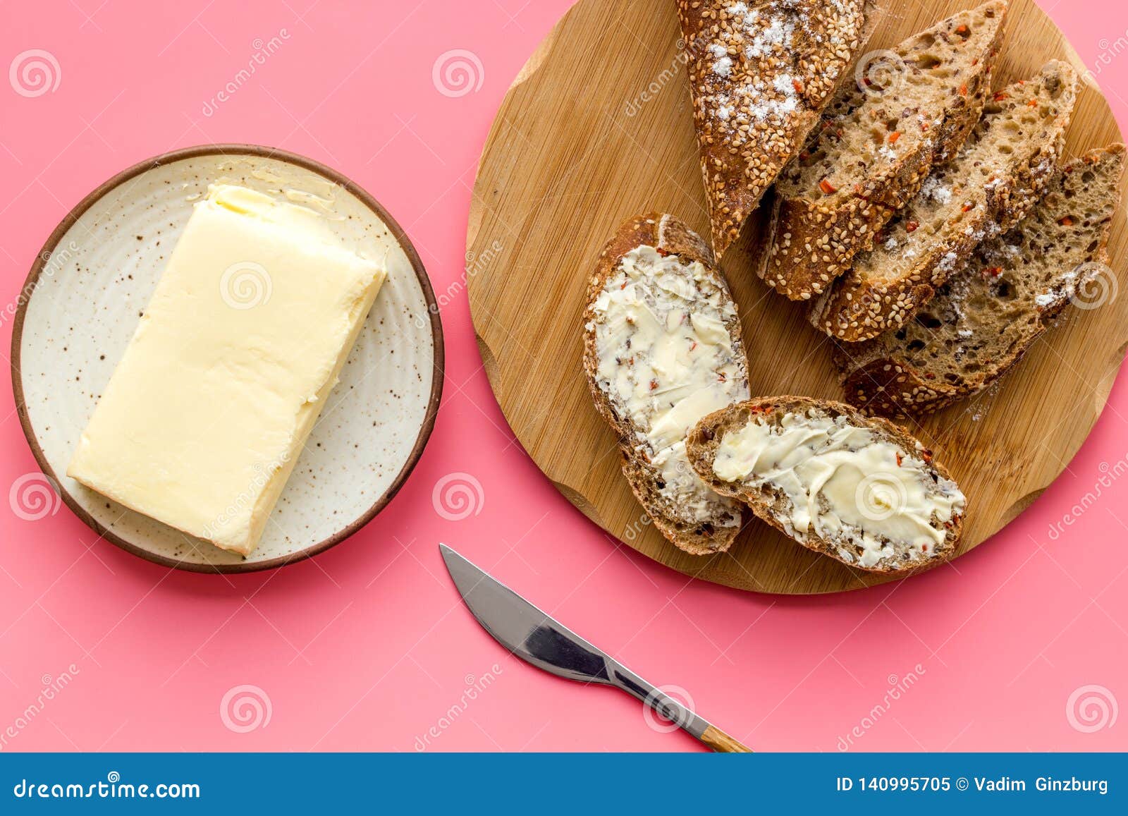 Slice of Bread with Butter on Pink Background Top View Stock Image ...