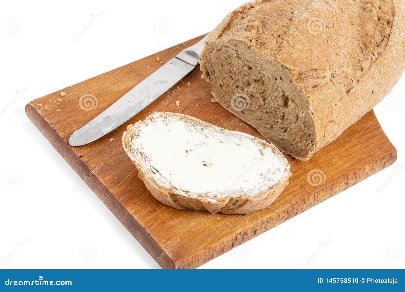 Slice of the Bread with Butter on the Wooden Board Stock Photo - Image ...